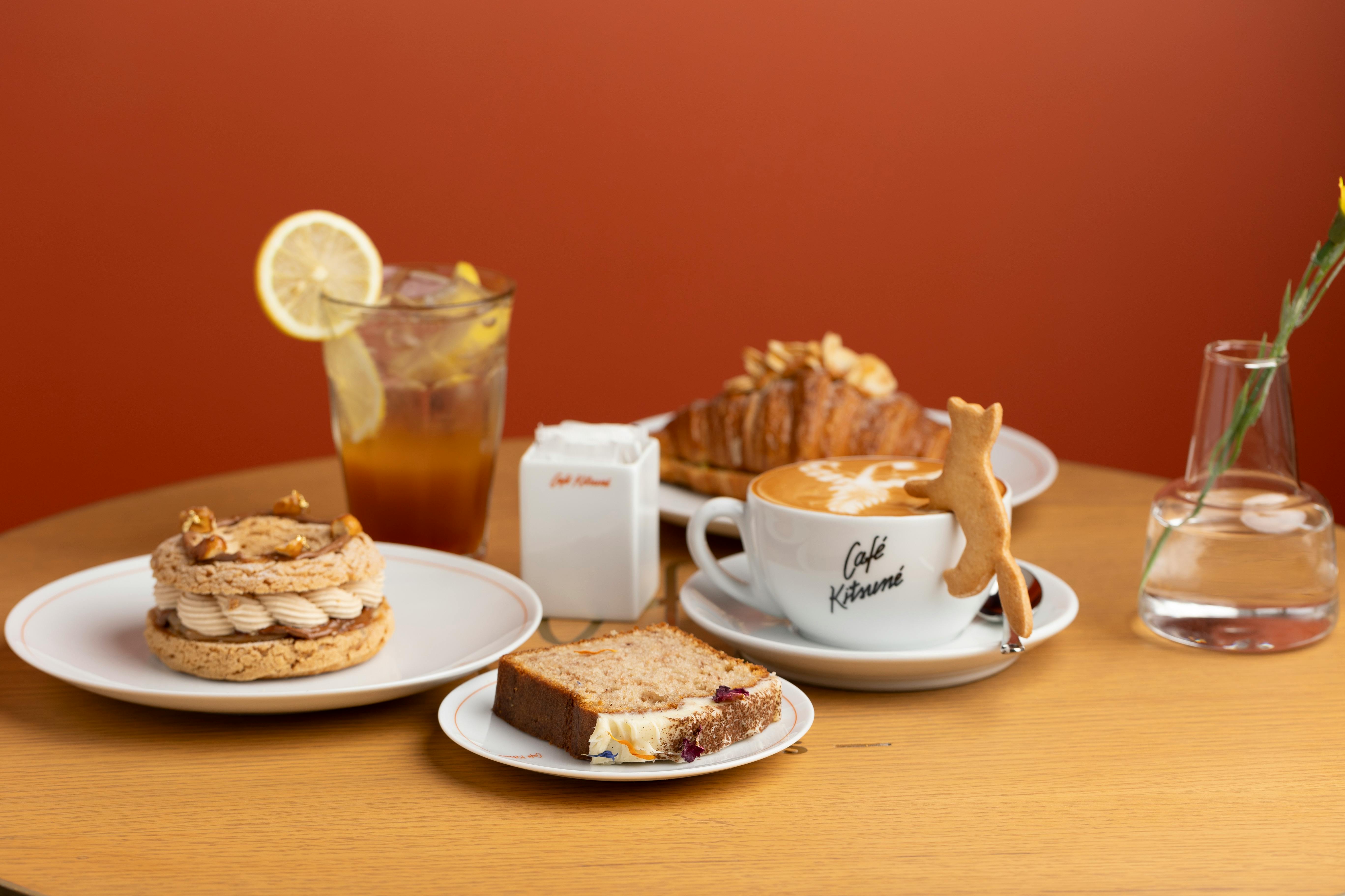 Elegant Café Pastries and Coffee Display · Free Stock Photo