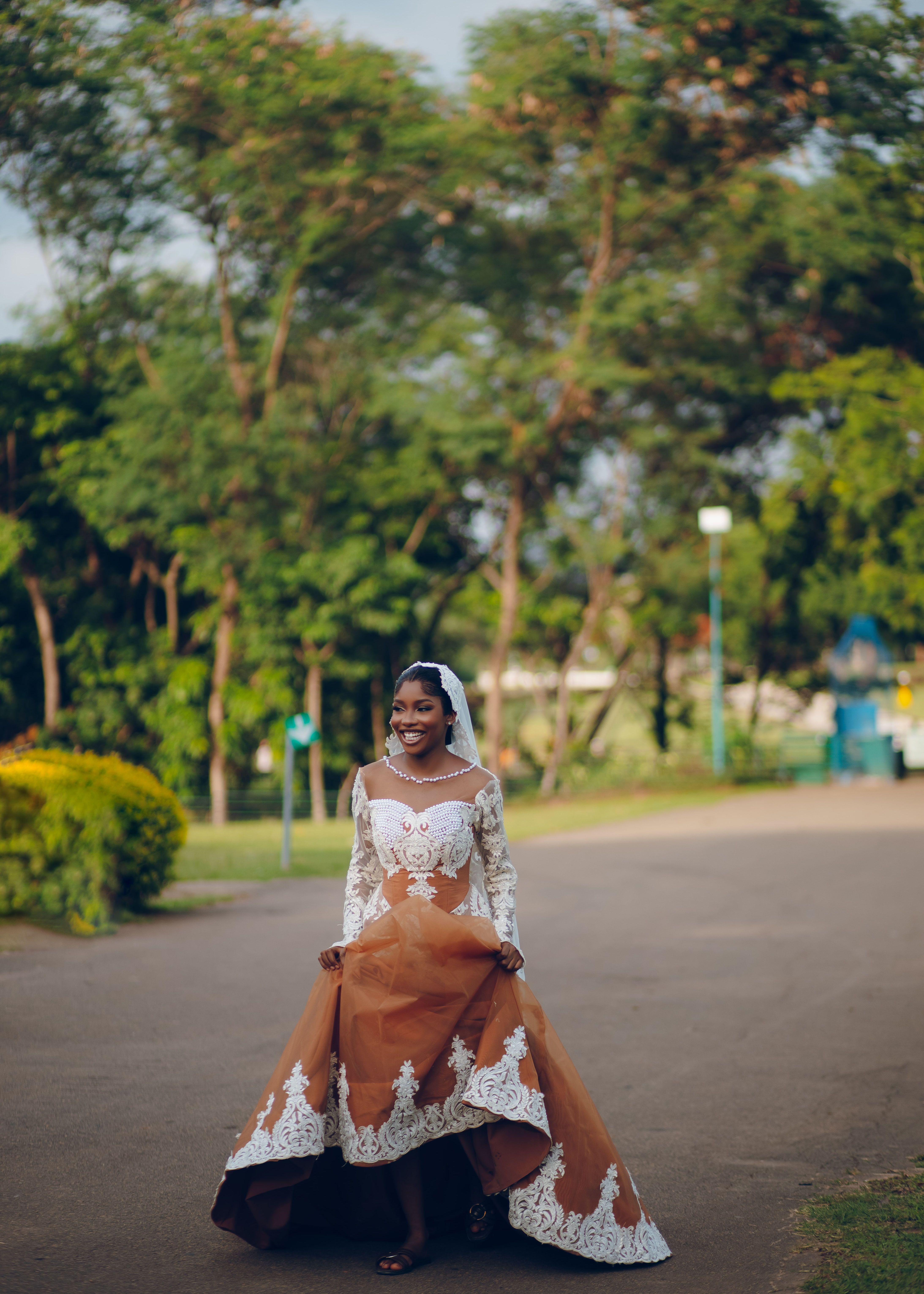 Elegant Bride in Rustic Brown Bridal Gown Outdoors · Free Stock Photo