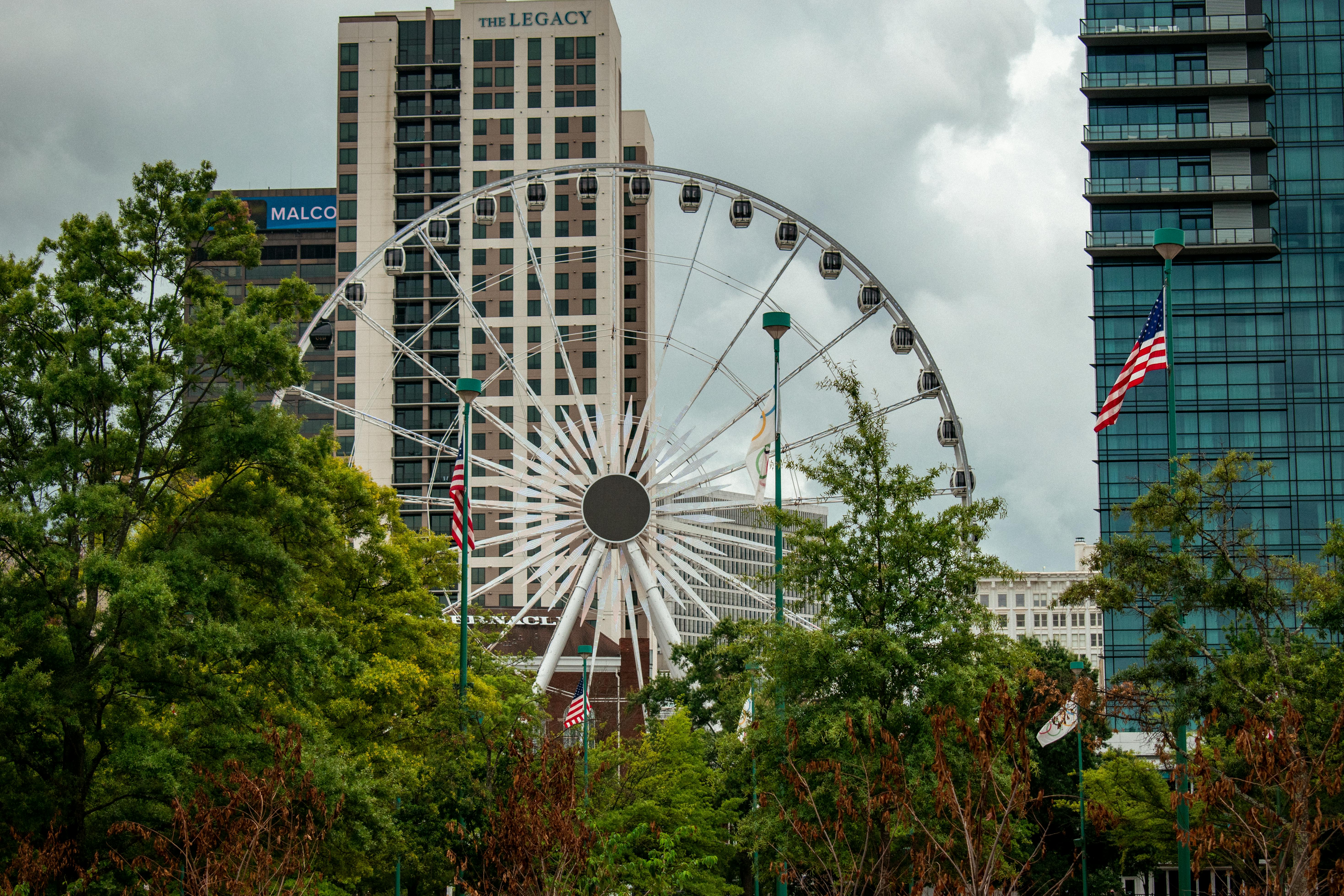 Atlanta SkyView Observation Wheel Amidst Skyline · Free Stock Photo