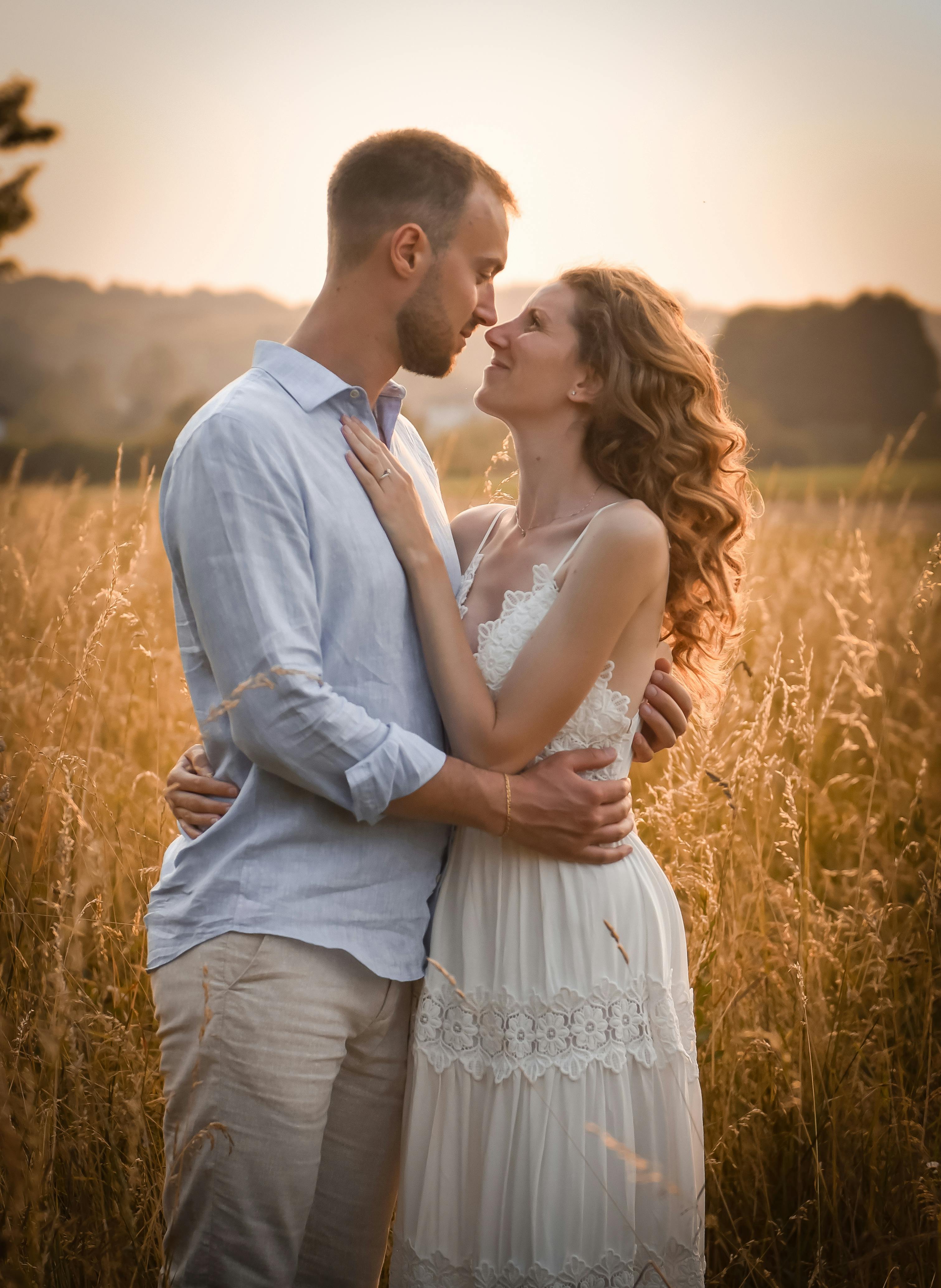 Romantic Couple in Field at Sunset, Como, Italy · Free Stock Photo