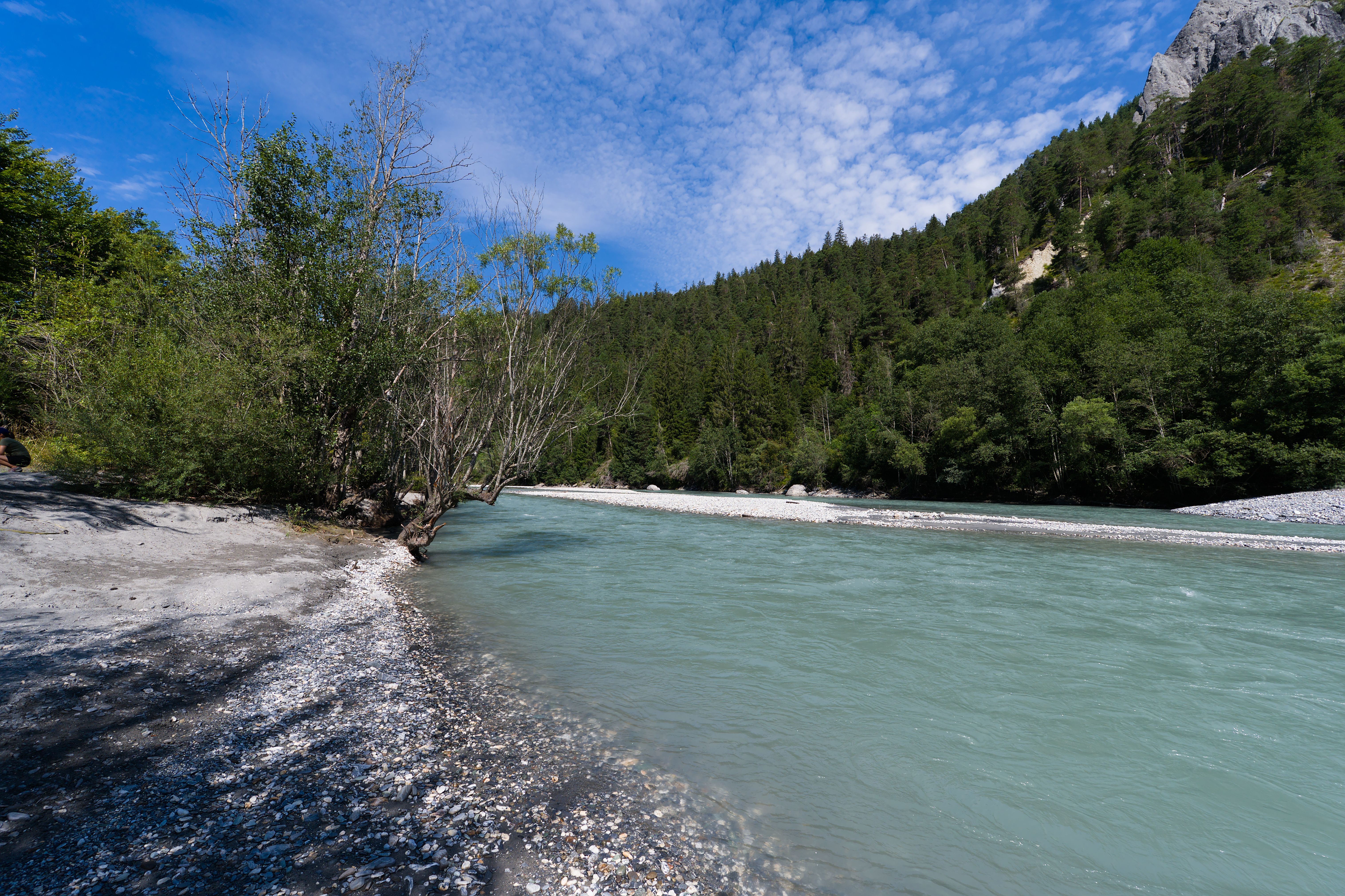 Scenic River in Swiss Alpine Landscape · Free Stock Photo