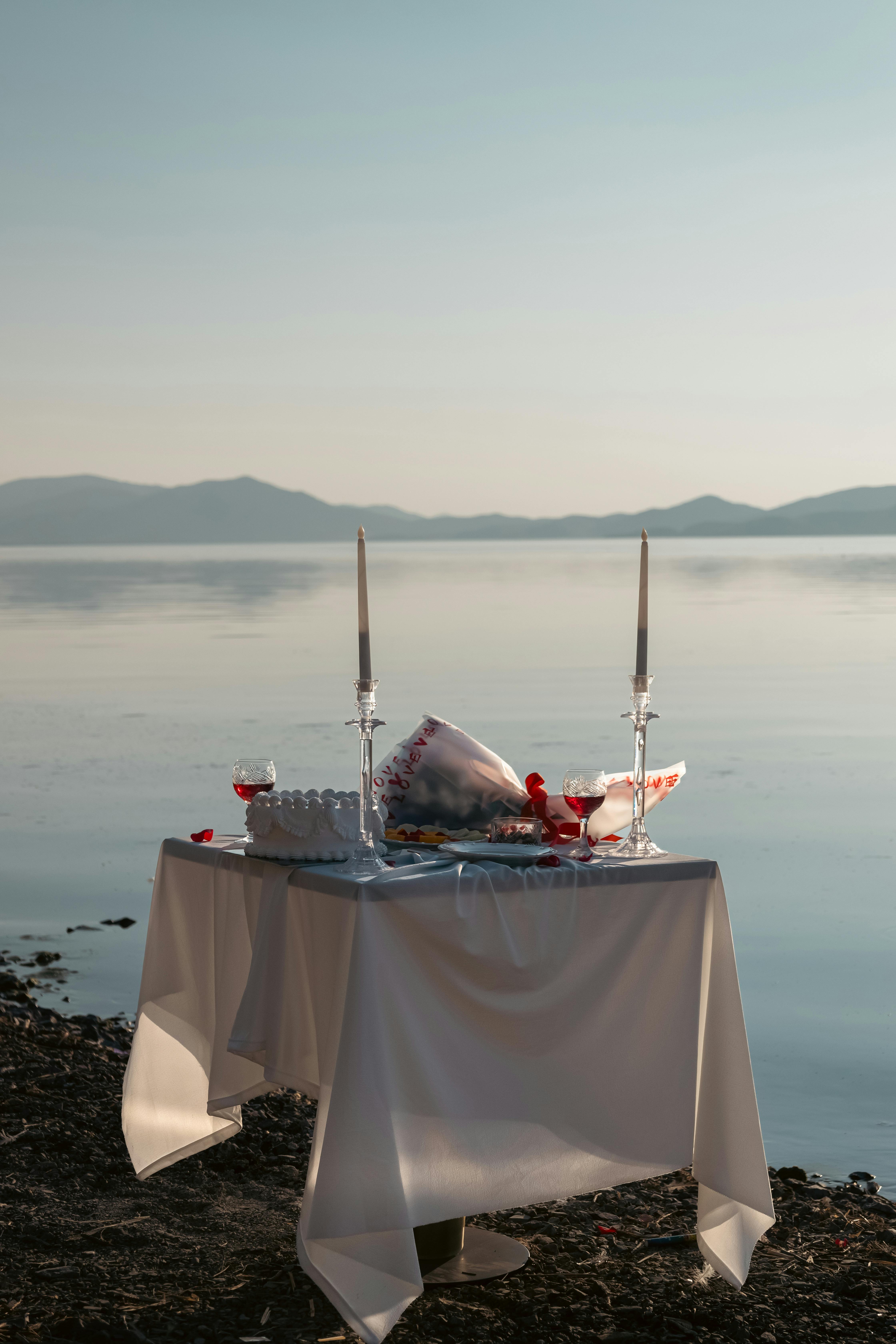 Romantic Lakeside Table Setting at Sunrise · Free Stock Photo