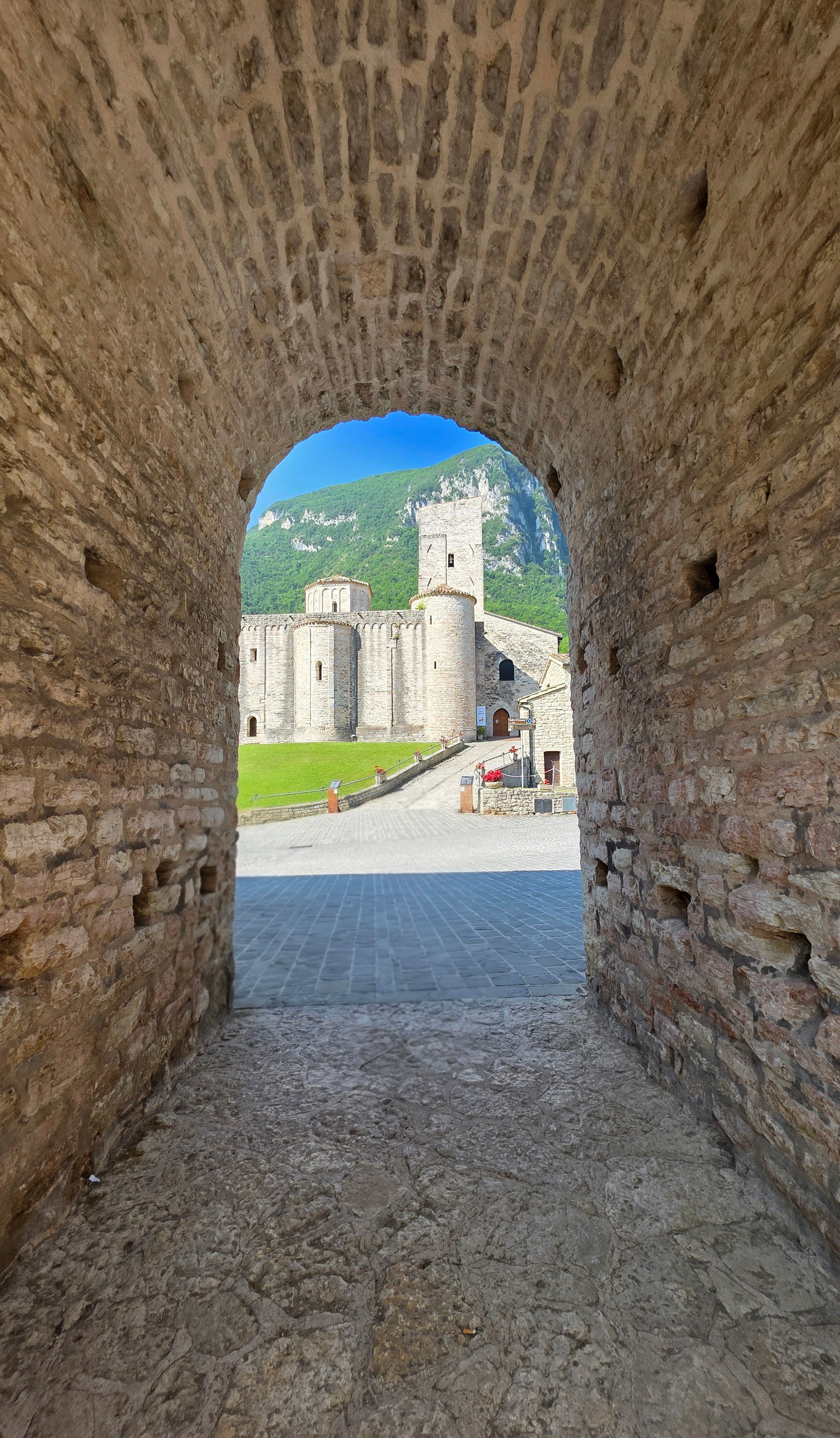 Medieval Stone Castle Seen Through Archway · Free Stock Photo