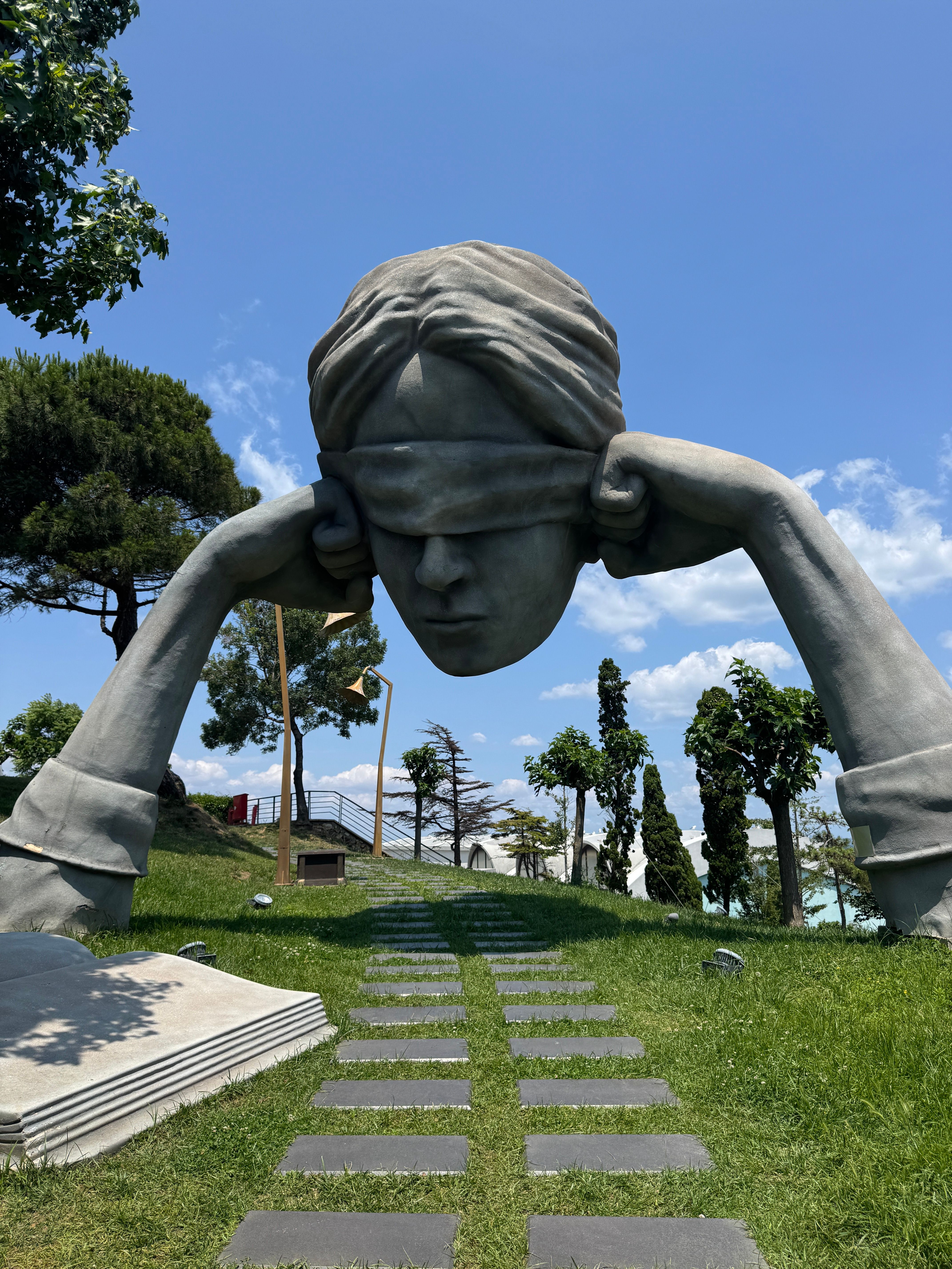Impressive Blindfolded Statue in Lush Park · Free Stock Photo