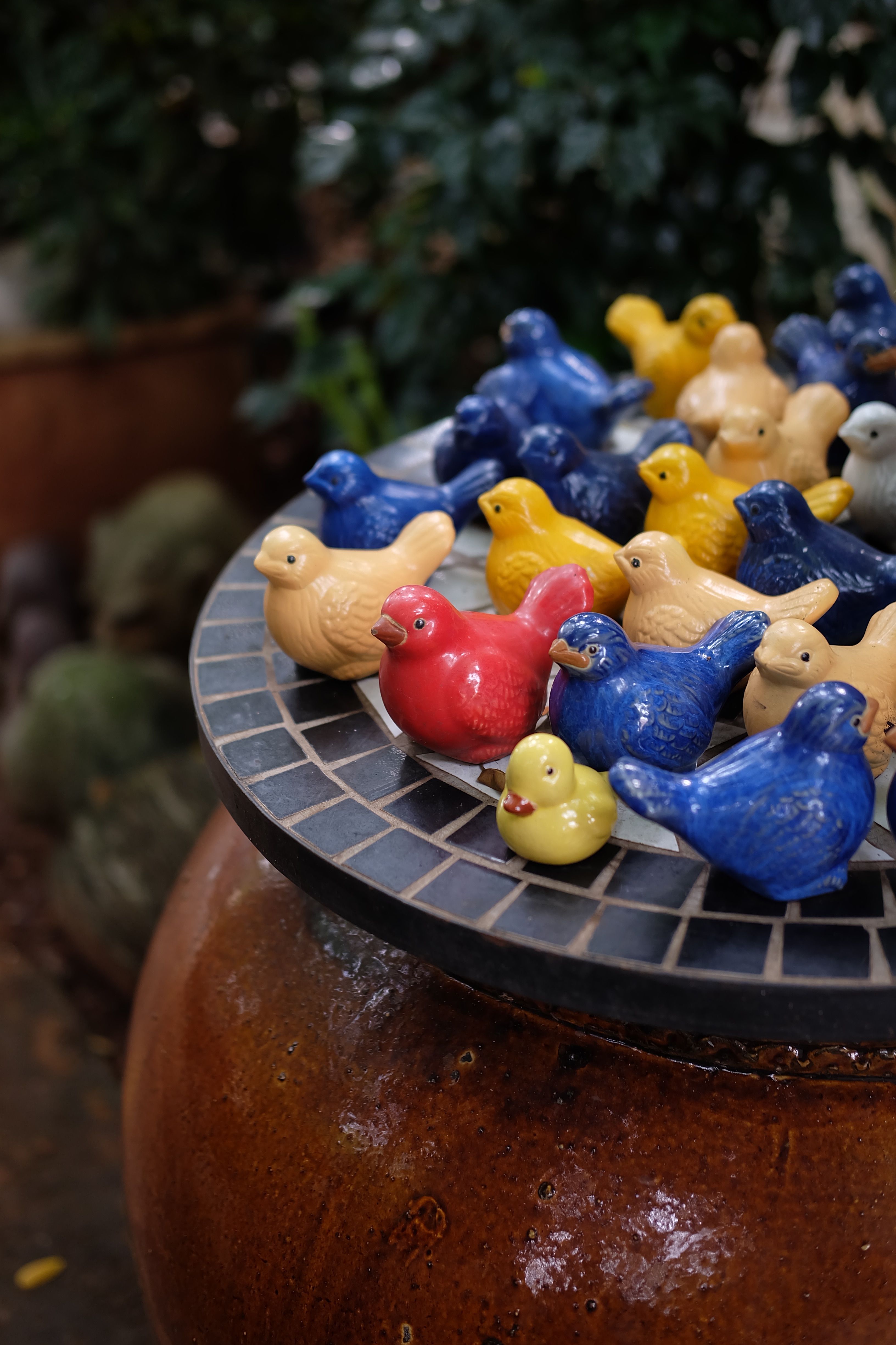 Colorful Ceramic Bird Statues on Display · Free Stock Photo