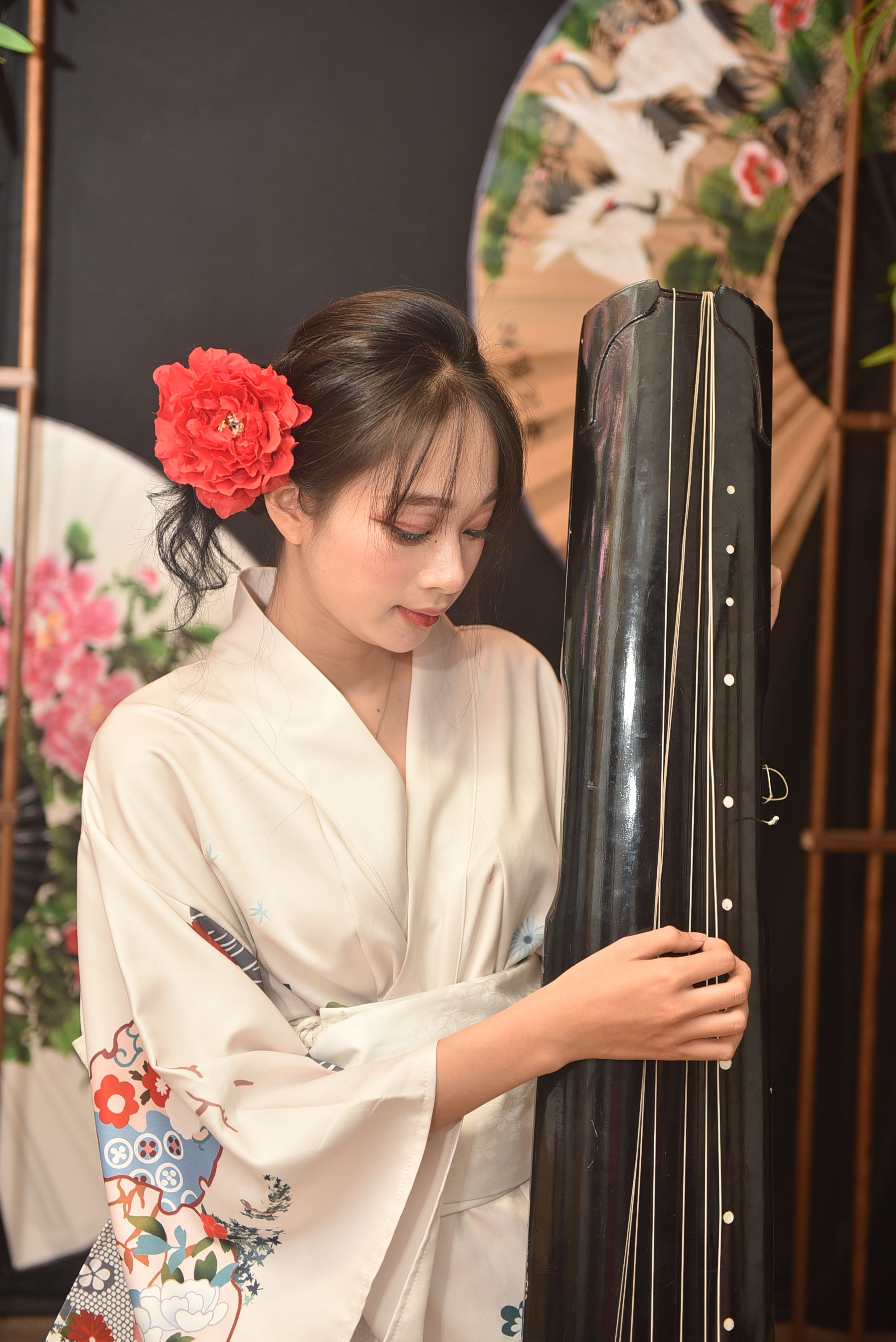 Elegant Portrait of Woman in Kimono Playing Koto · Free Stock Photo