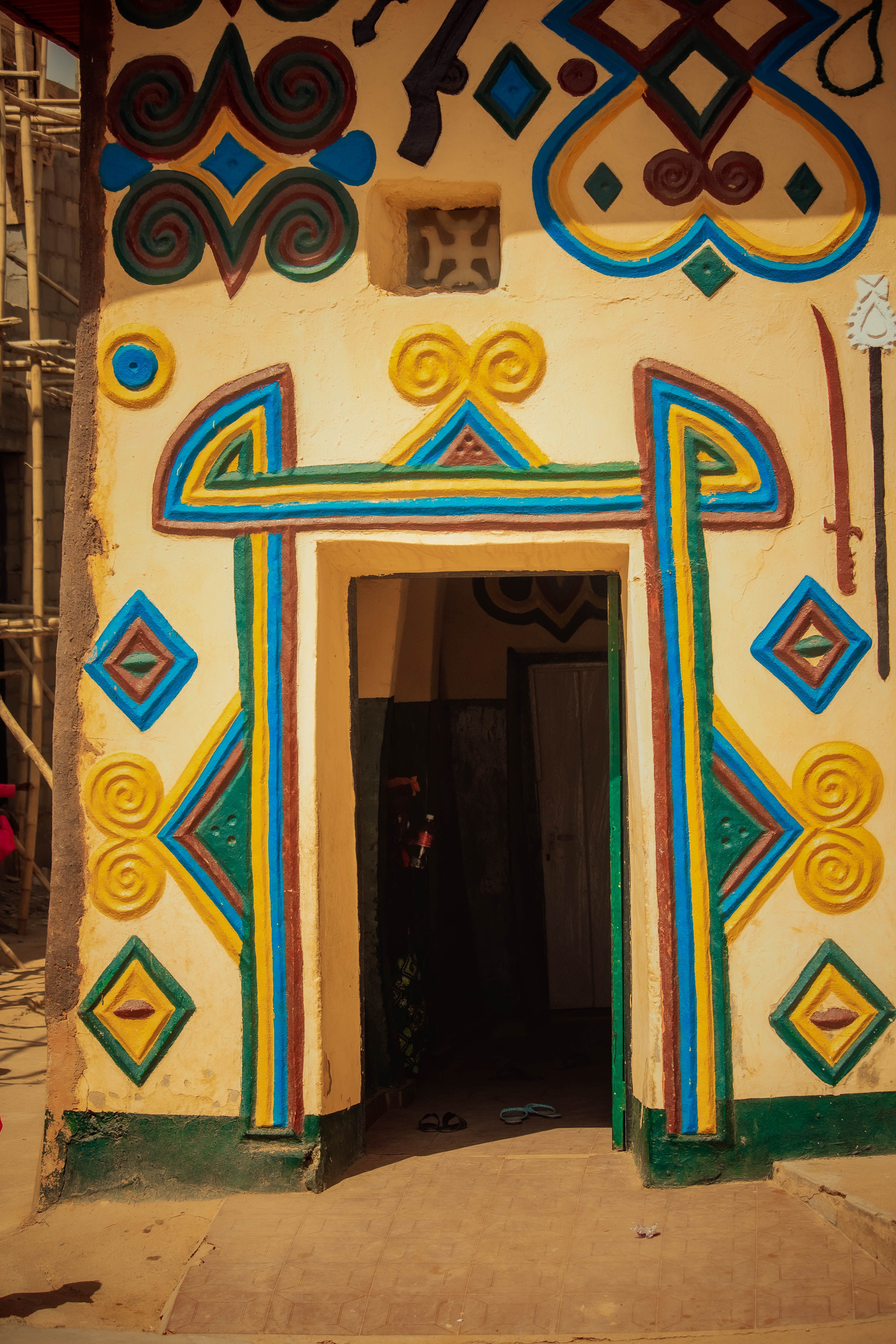 Vibrant Nubian Village Entrance with Geometric Art · Free Stock Photo
