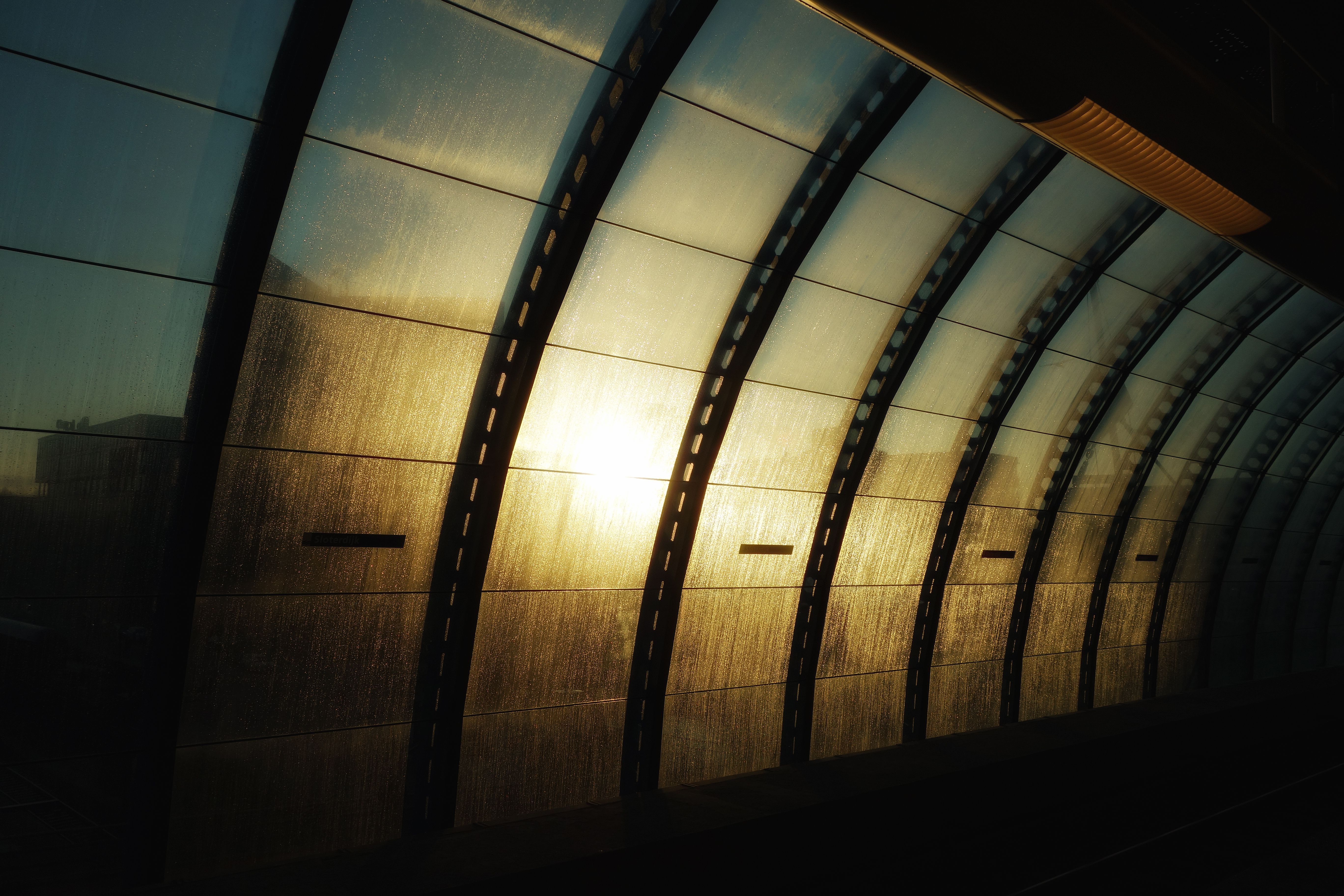 Sunset Light Streaming Through Train Station Windows · Free Stock Photo