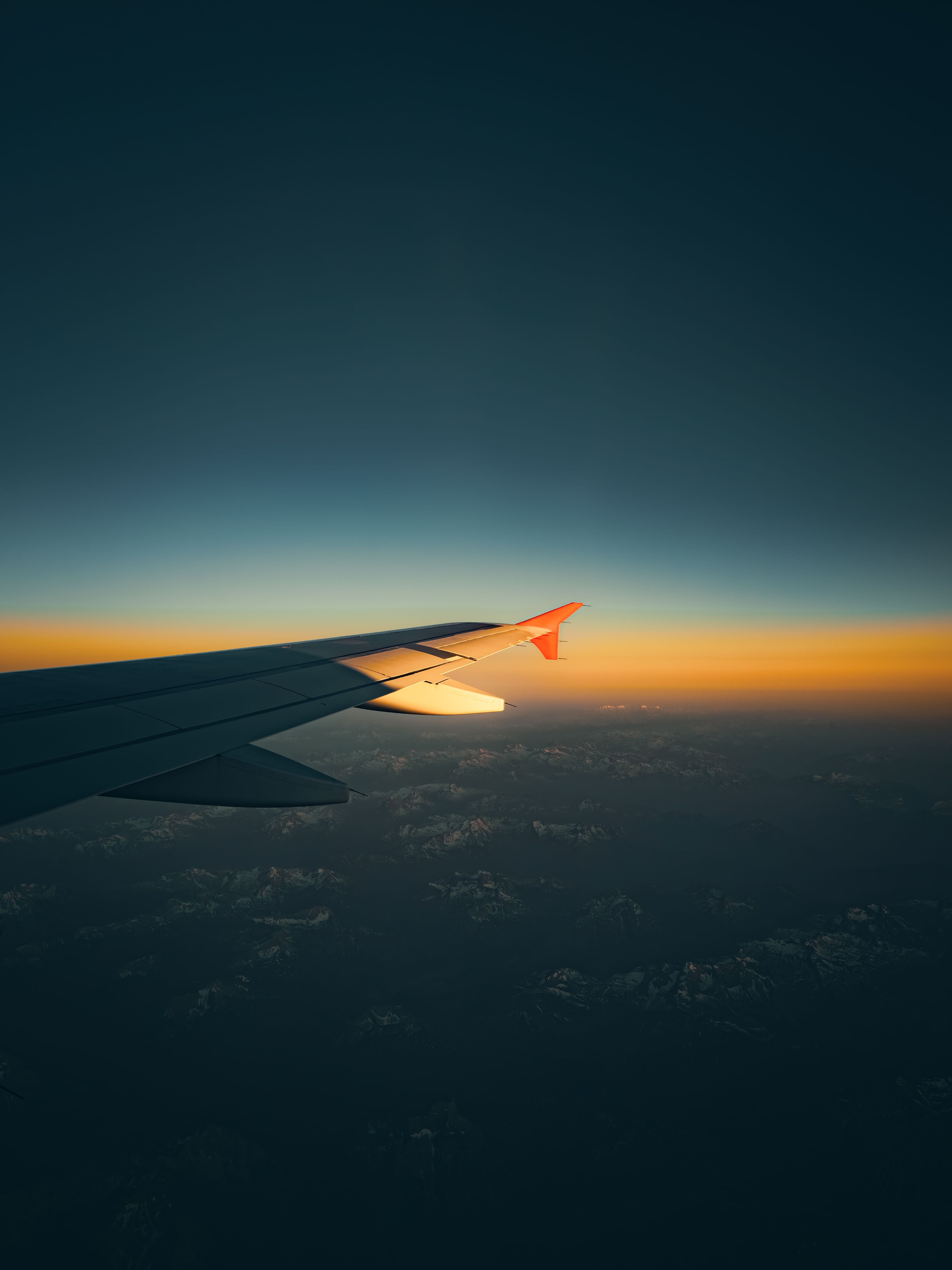 Stunning Aerial View of Sunset from Plane Window · Free Stock Photo