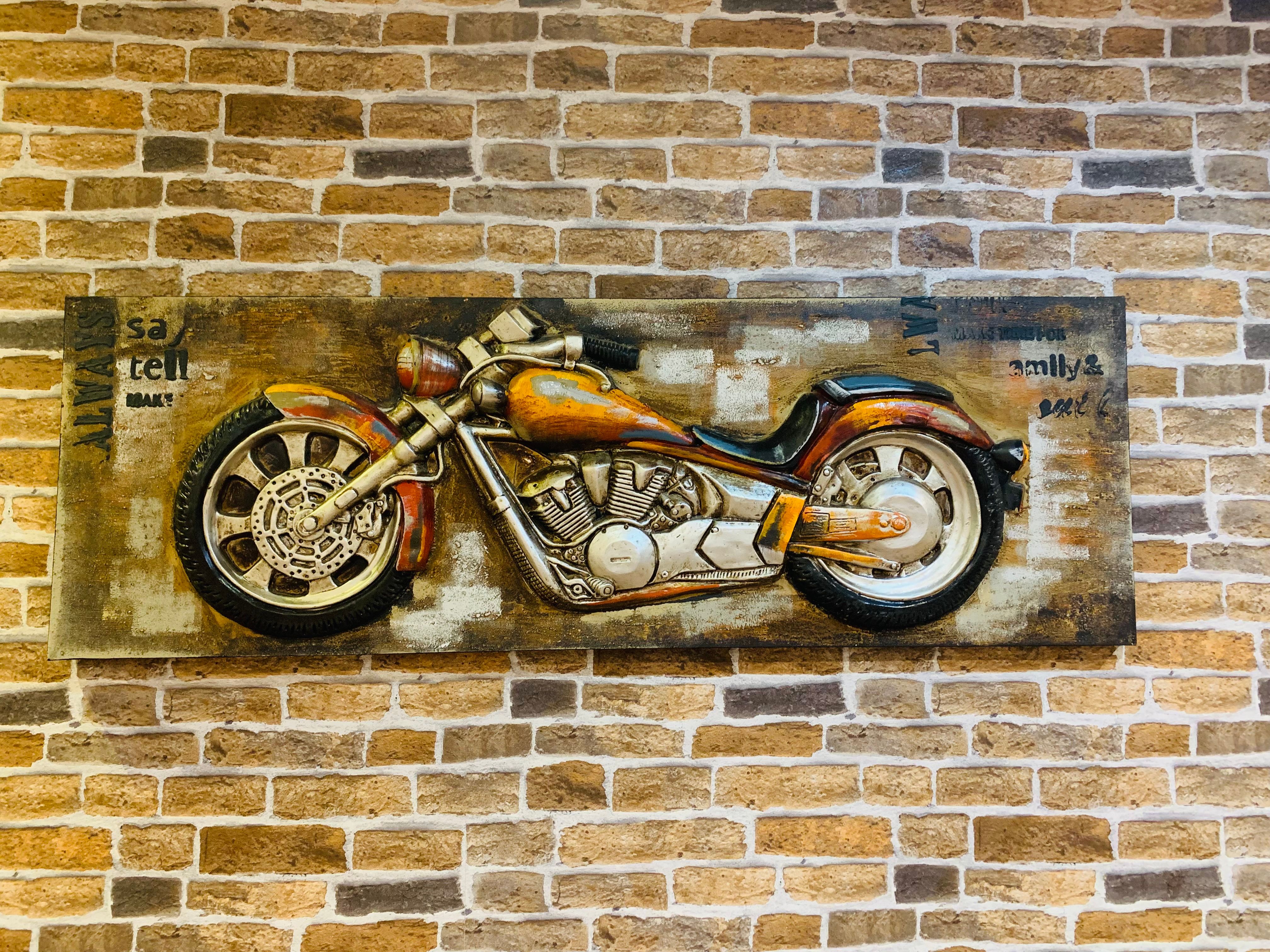 Vintage Motorcycle Wall Art on Brick Background · Free Stock Photo