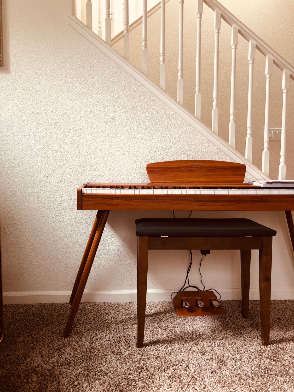 Modern Wooden Keyboard Piano in Cozy Home Setting · Free Stock Photo