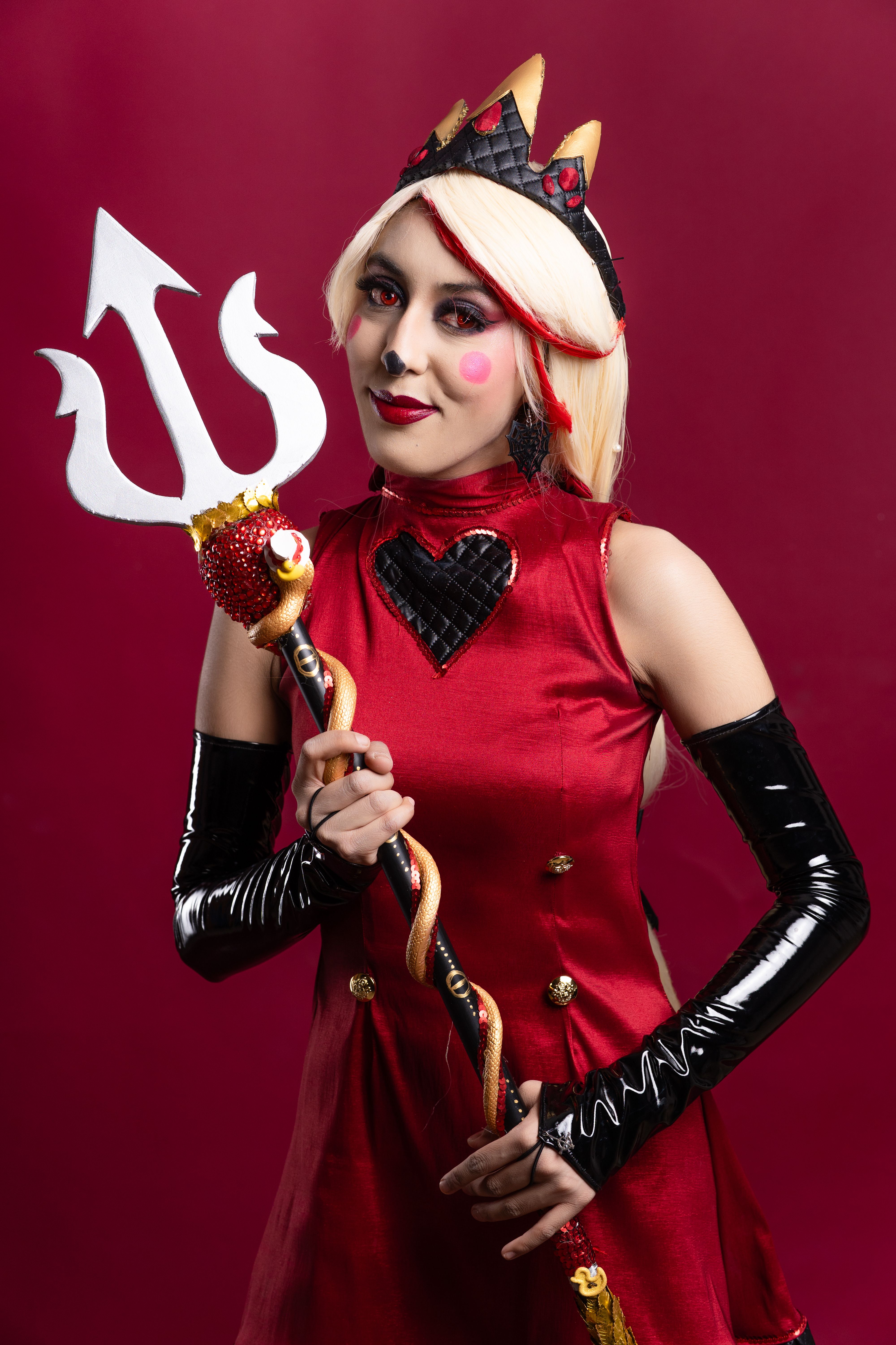 Cosplayer in Red Dress with Trident · Free Stock Photo