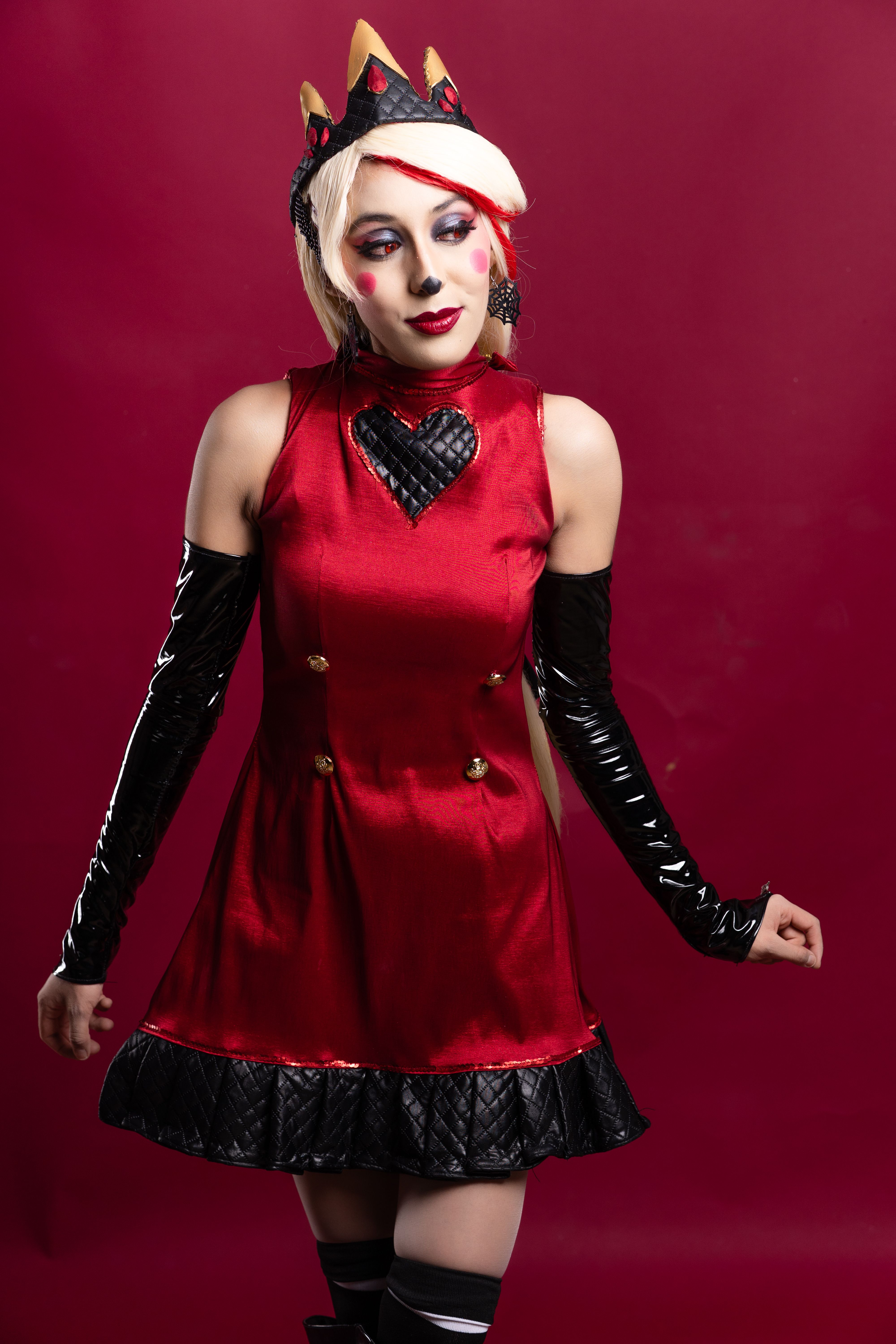 Vibrant Female Cosplayer in Red Costume · Free Stock Photo