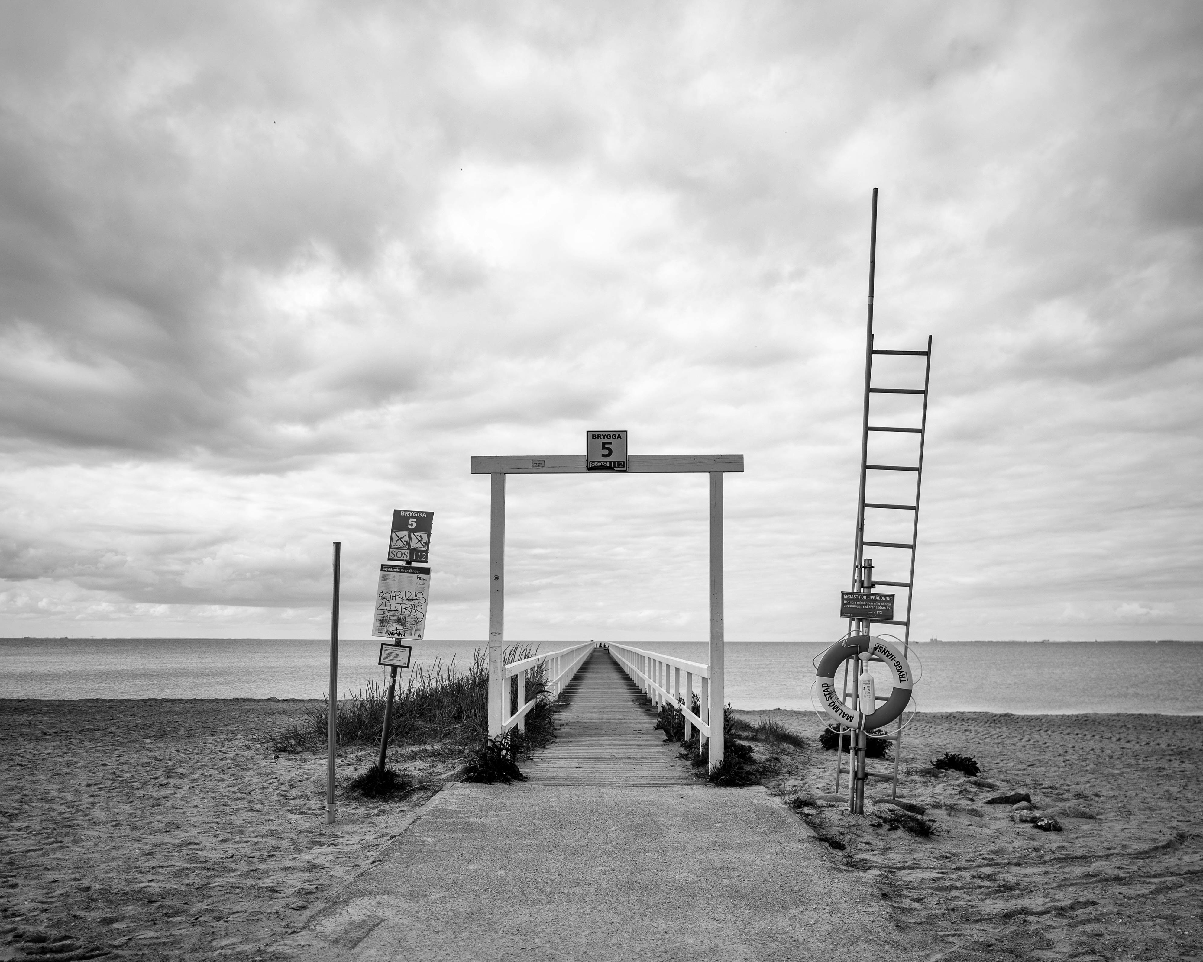 Monochrome Beach Pier in Skåne län, Sweden · Free Stock Photo
