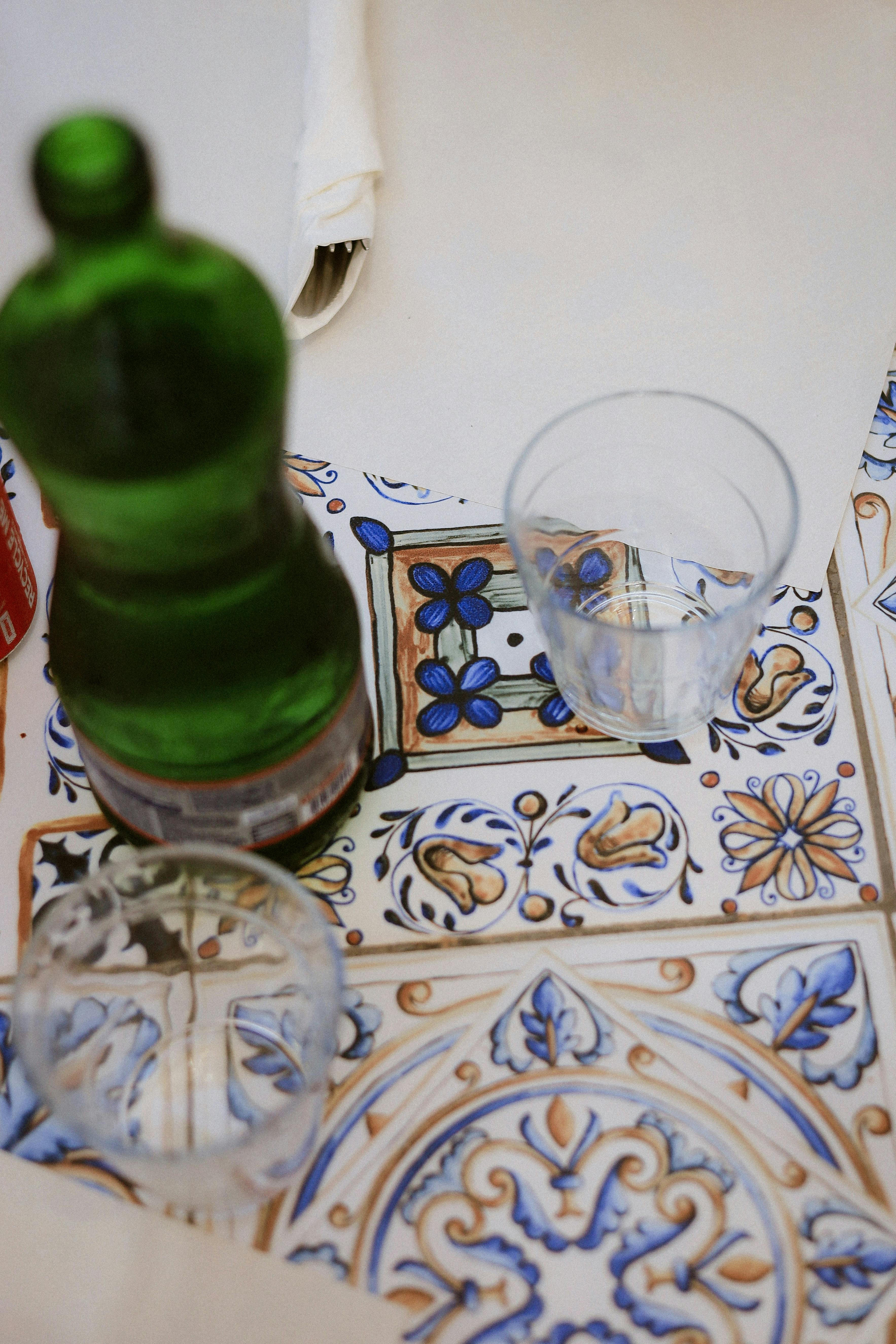 Colorful Mediterranean Table Setting with Bottles · Free Stock Photo