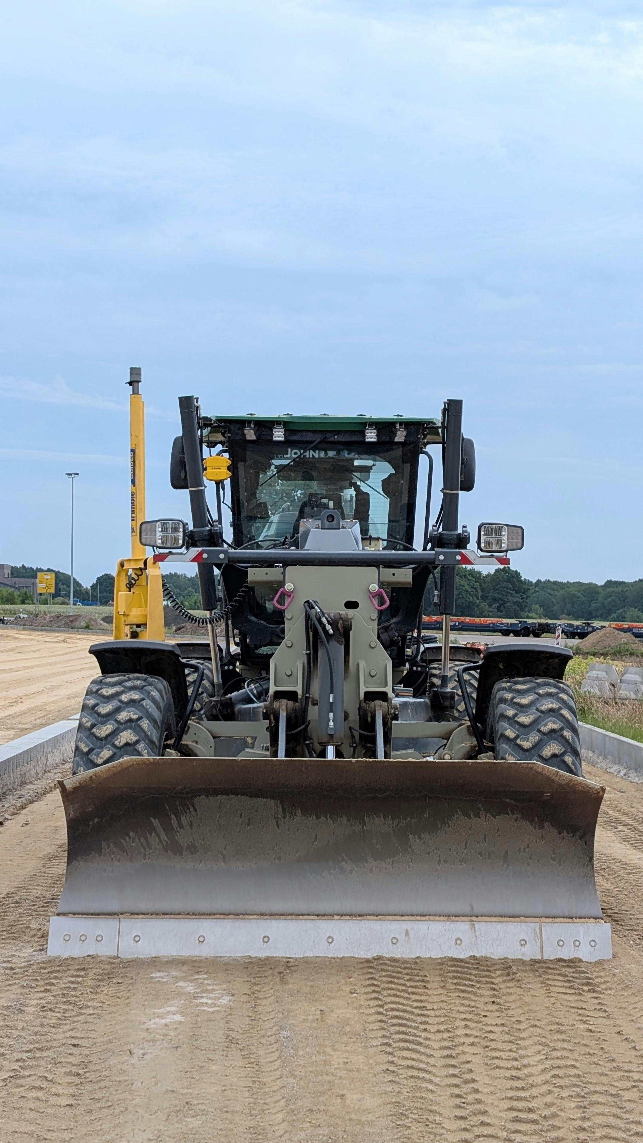 Heavy Construction Machine on Sand Roadwork Site · Free Stock Photo