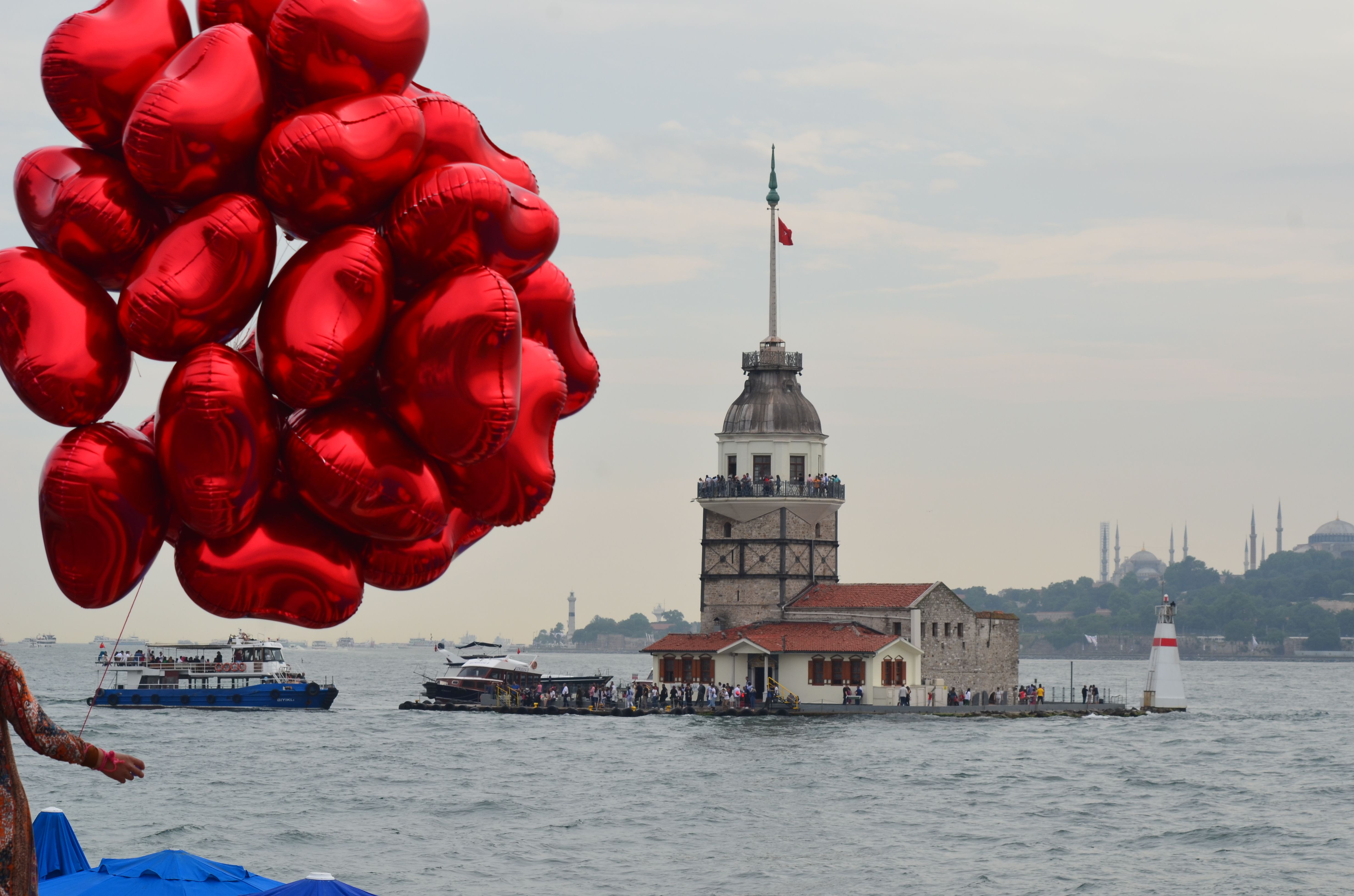 Maiden's Tower with Red Heart Balloons in Istanbul · Free Stock Photo