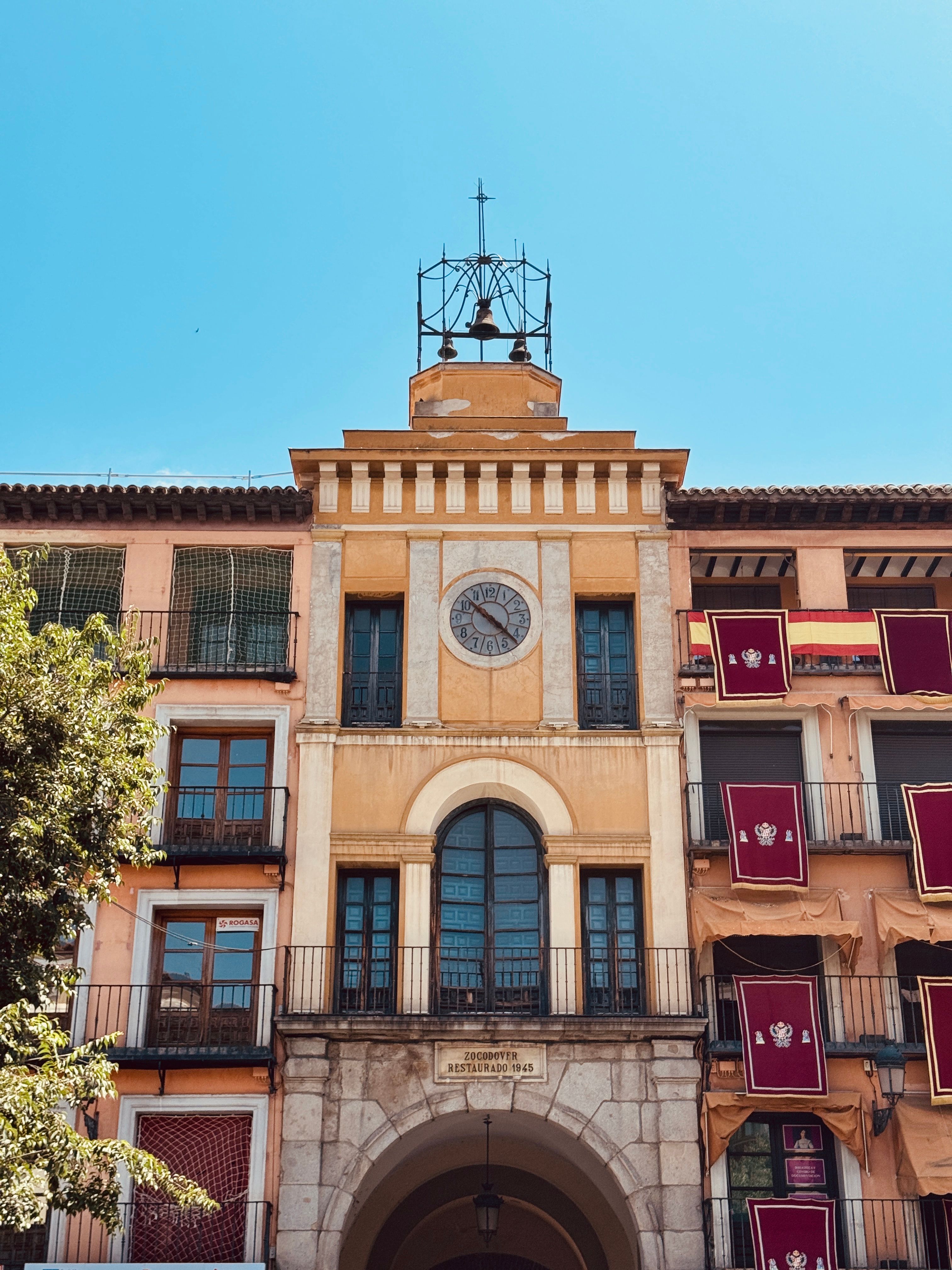 Historic Building Facade with Clock Tower in Spain · Free Stock Photo