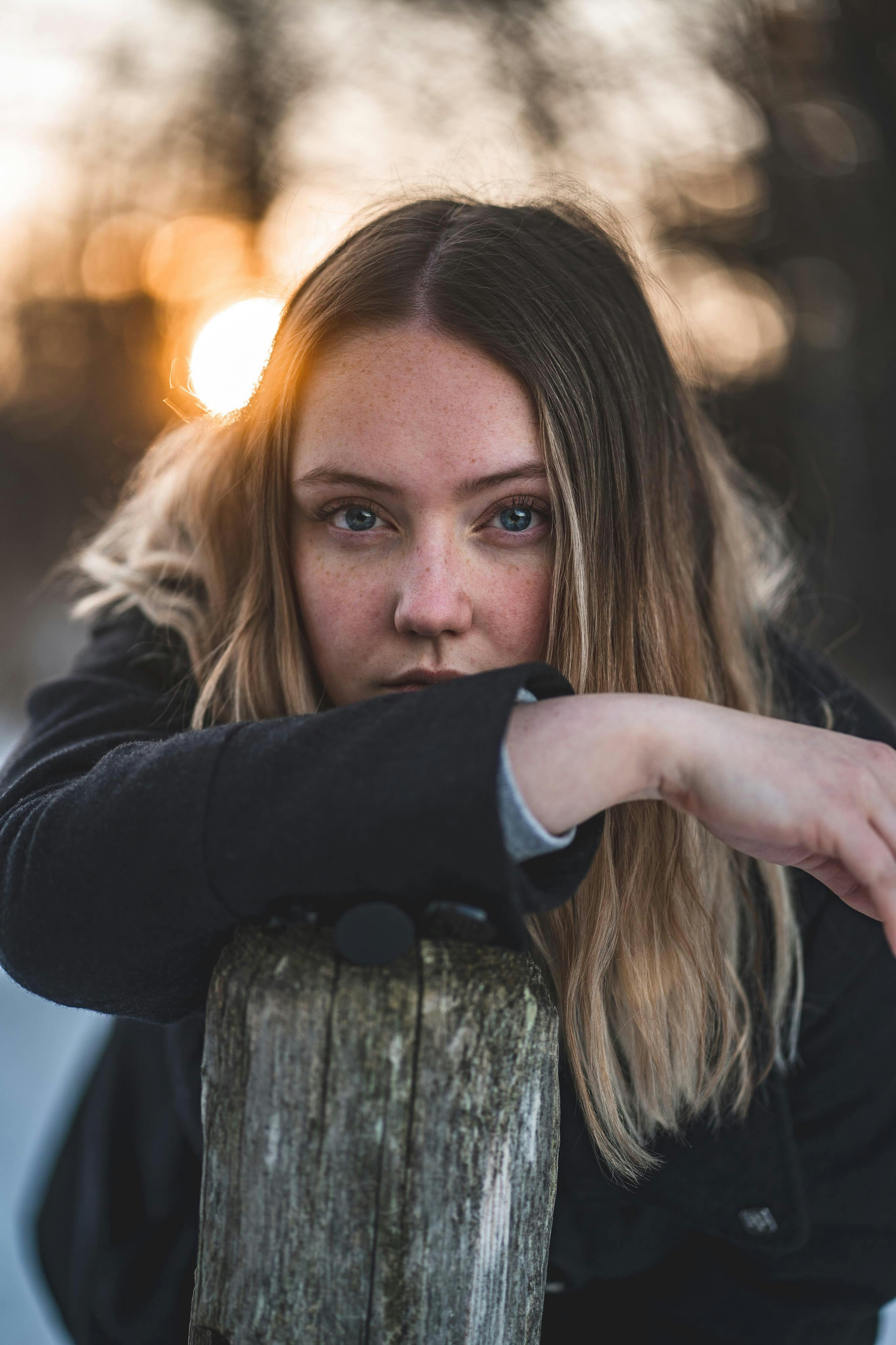 Woman Leaning Forward on Wood Plank · Free Stock Photo