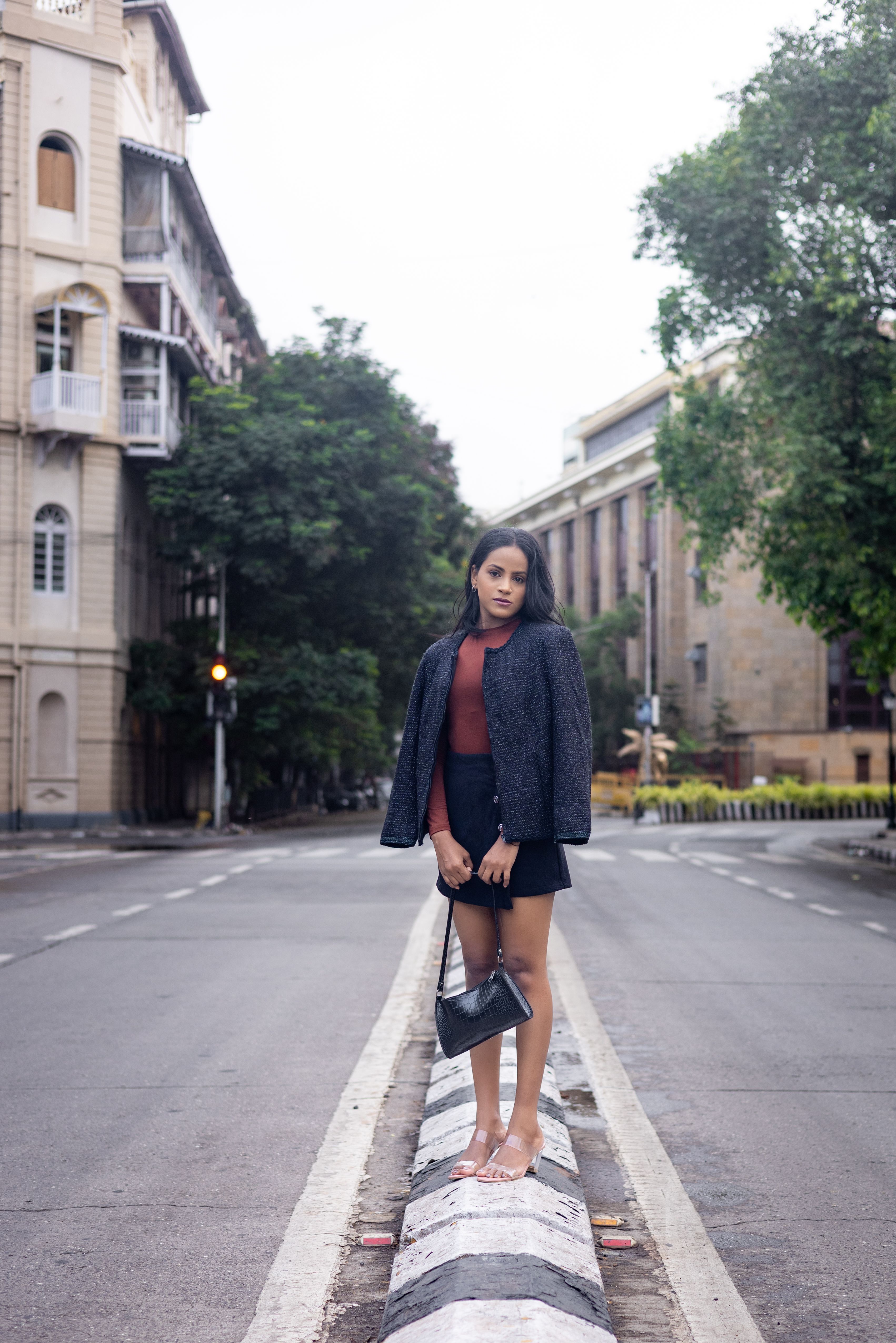 Stylish Woman in Urban Street Setting · Free Stock Photo