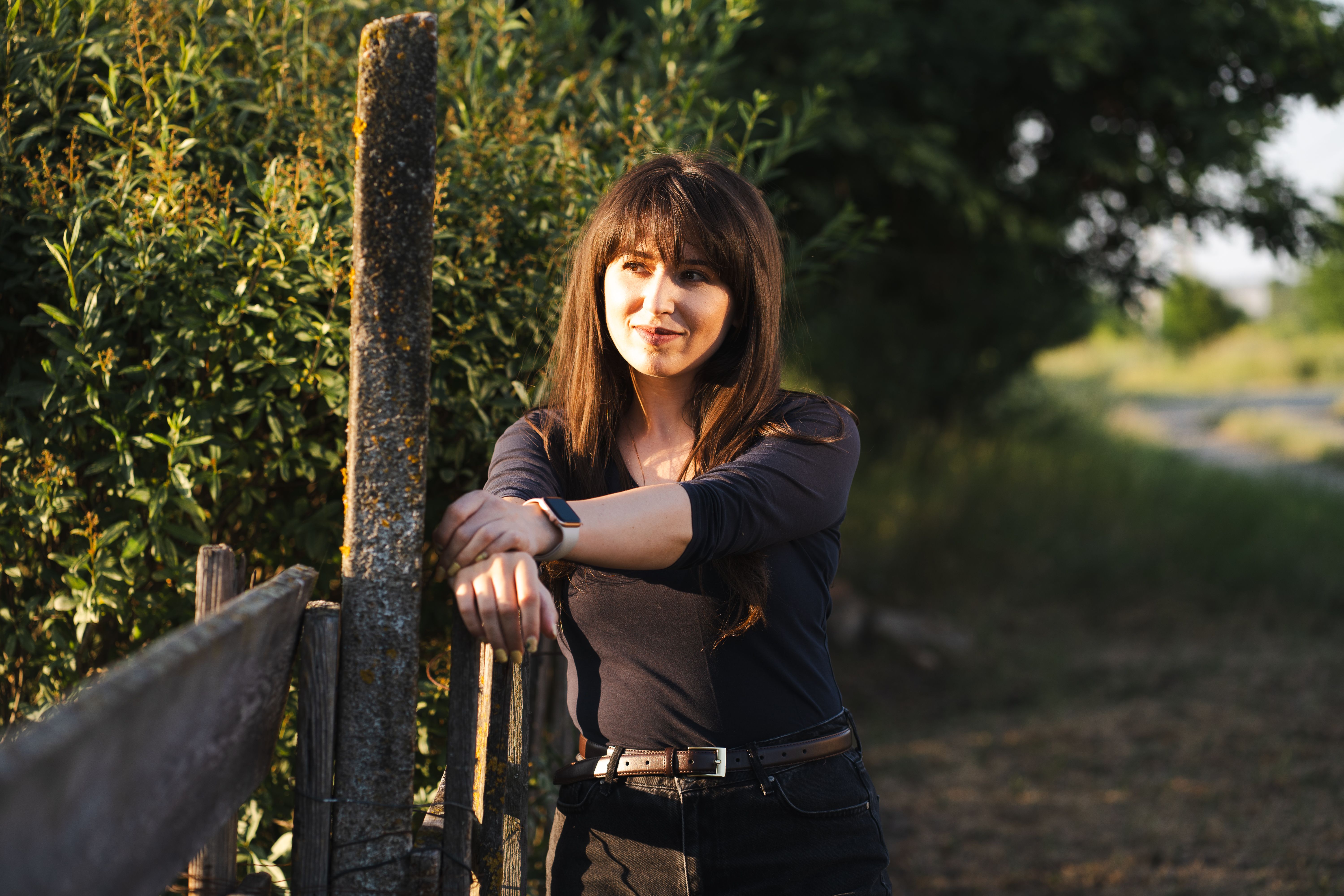 Young Woman Enjoying Sunset in Countryside · Free Stock Photo