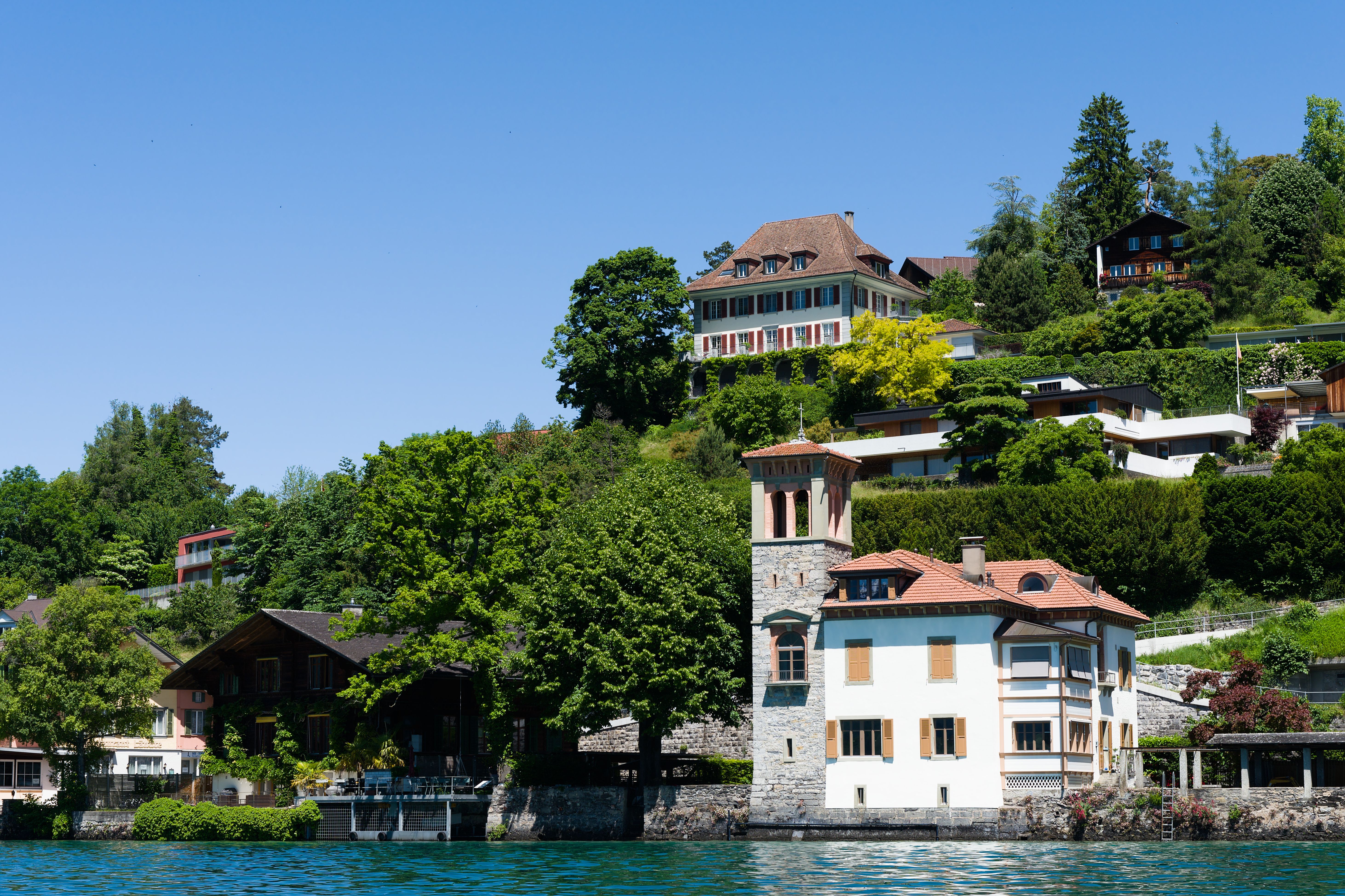 Scenic Swiss Lakeside Houses on a Sunny Day · Free Stock Photo
