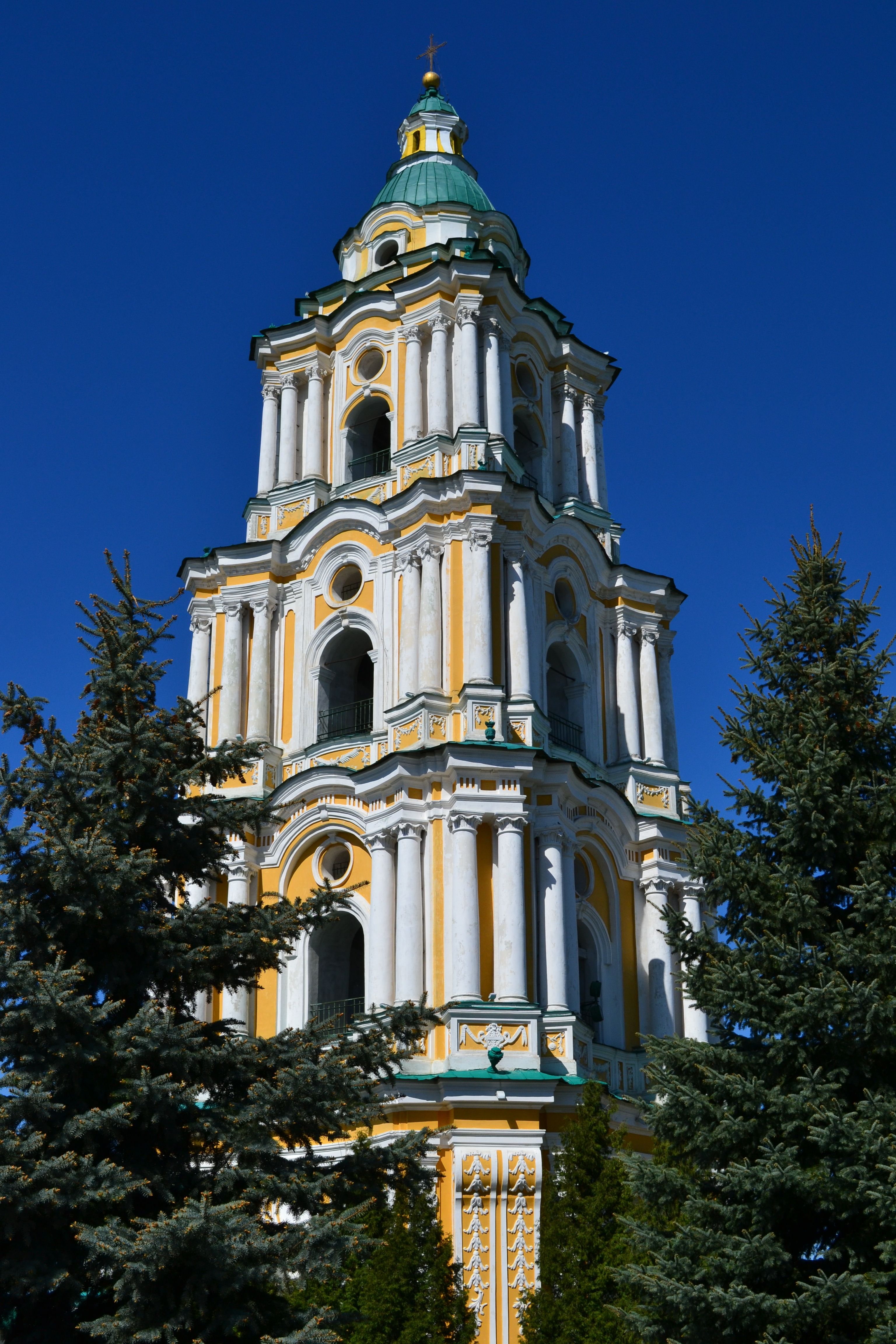 Stunning Baroque Bell Tower Under Clear Blue Sky · Free Stock Photo
