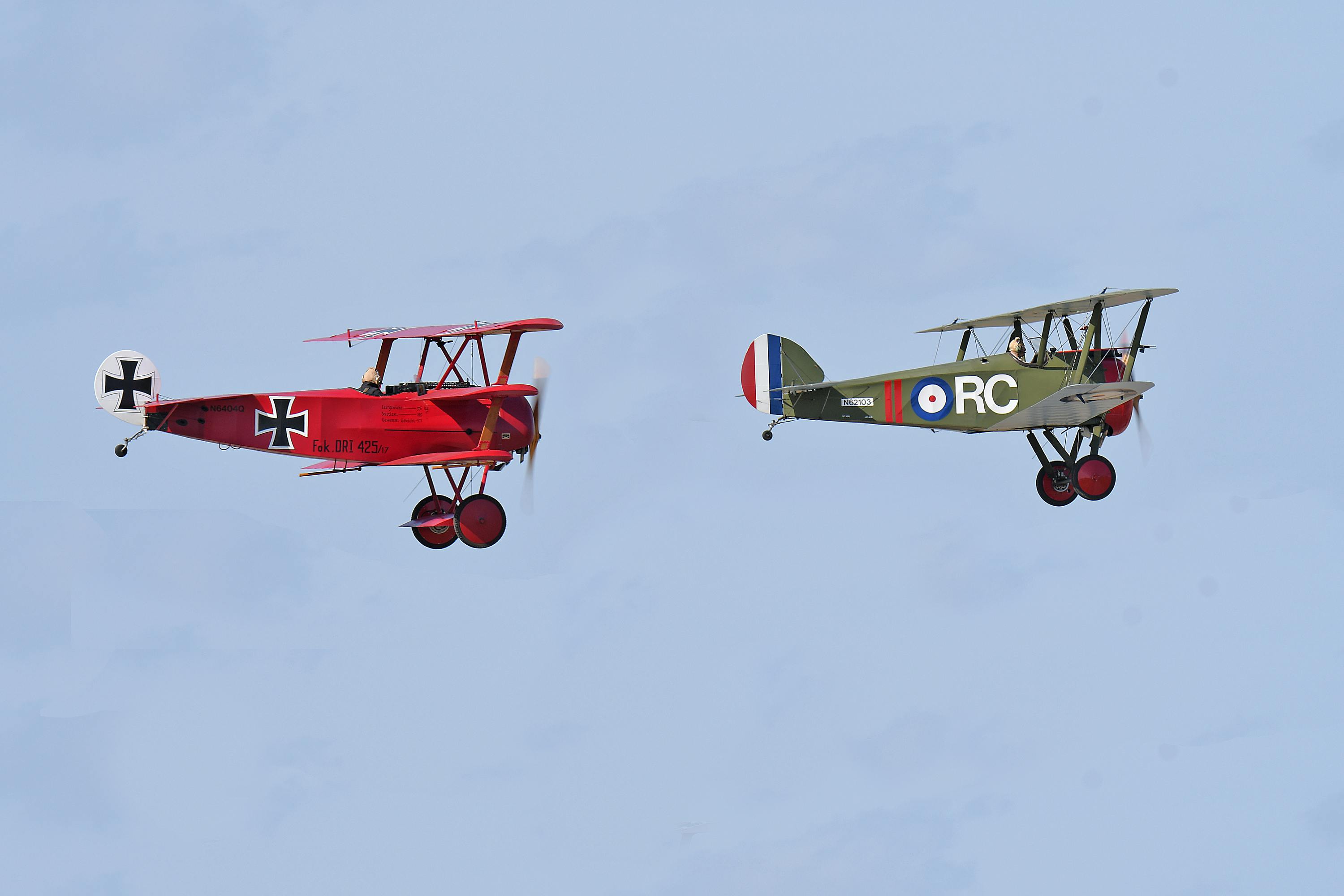 WWI Biplanes in Flight Over Florida Sky · Free Stock Photo