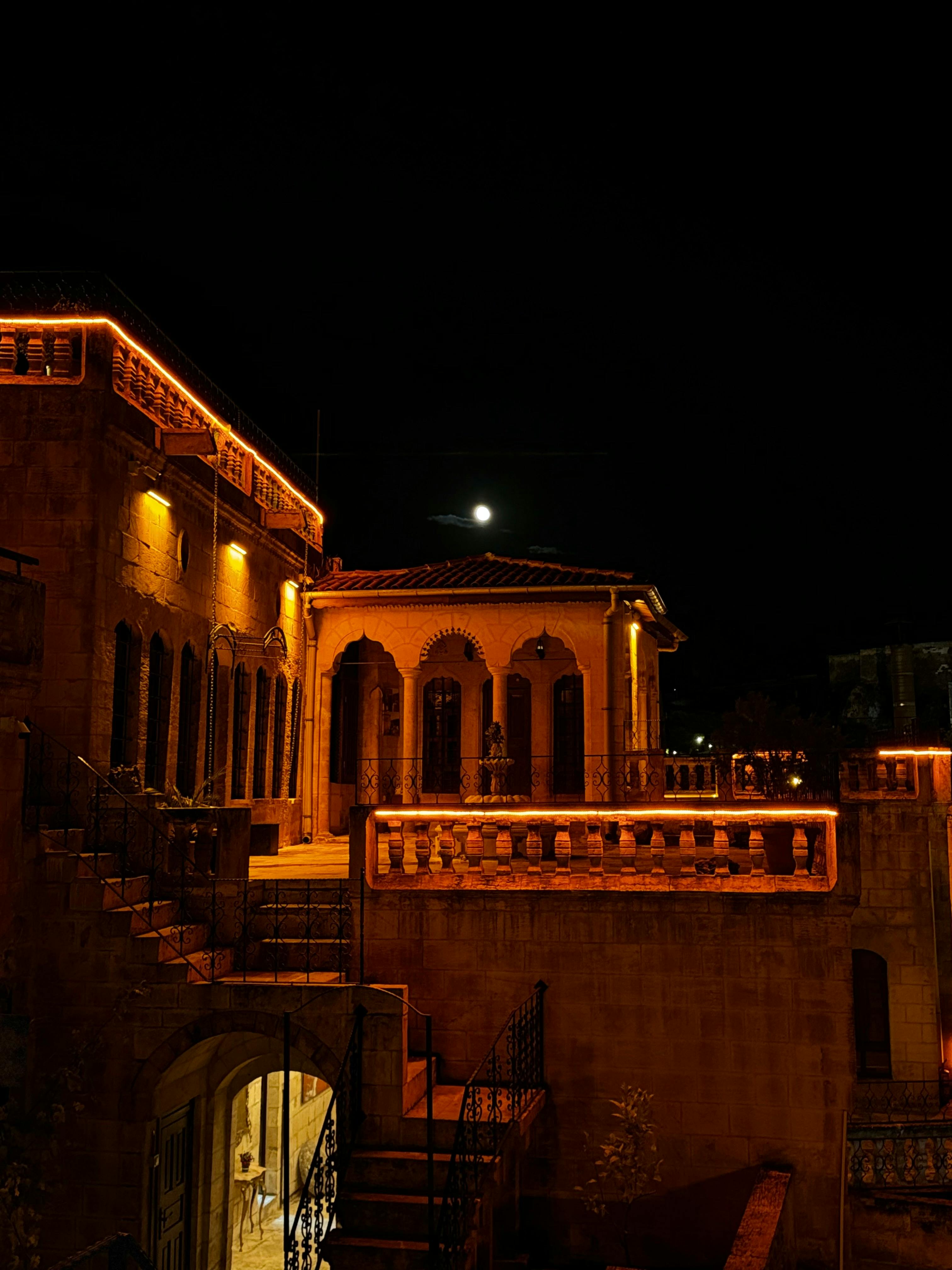 Illuminated Historic Building Under Moonlit Night · Free Stock Photo