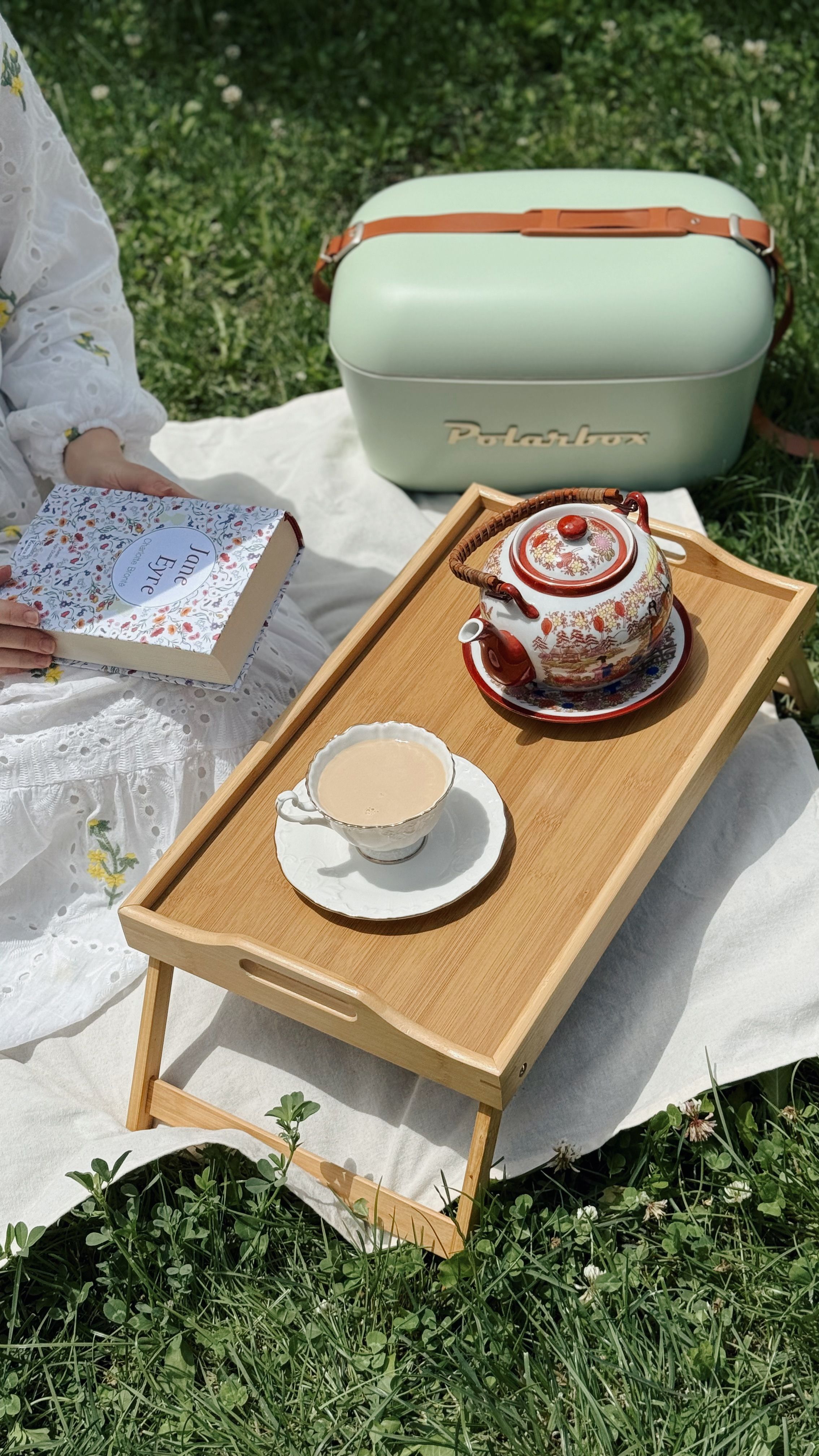 Elegant Outdoor Tea Party Setting on Grass · Free Stock Photo