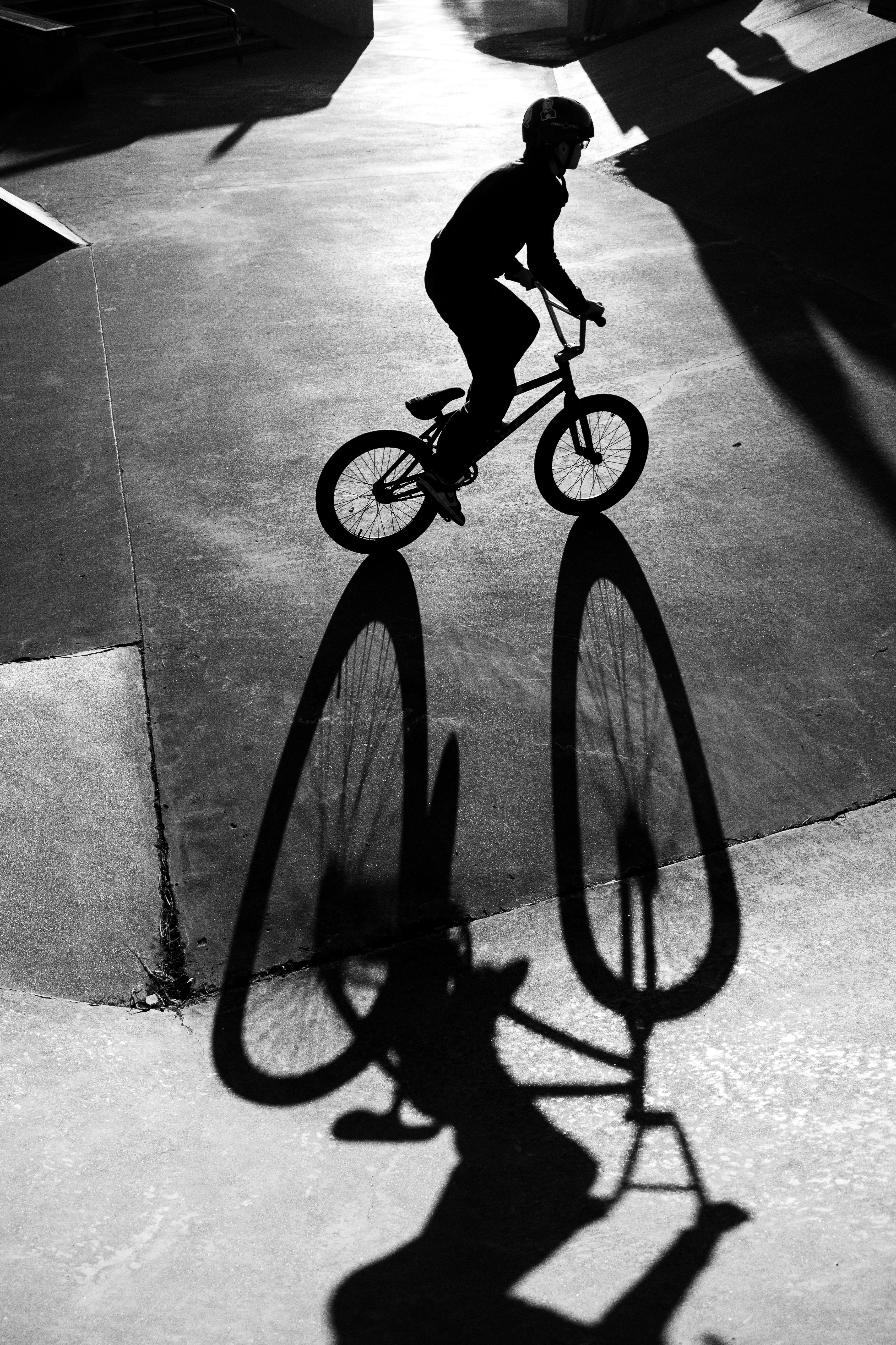 Dynamic BMX Silhouette in Urban Landscape · Free Stock Photo