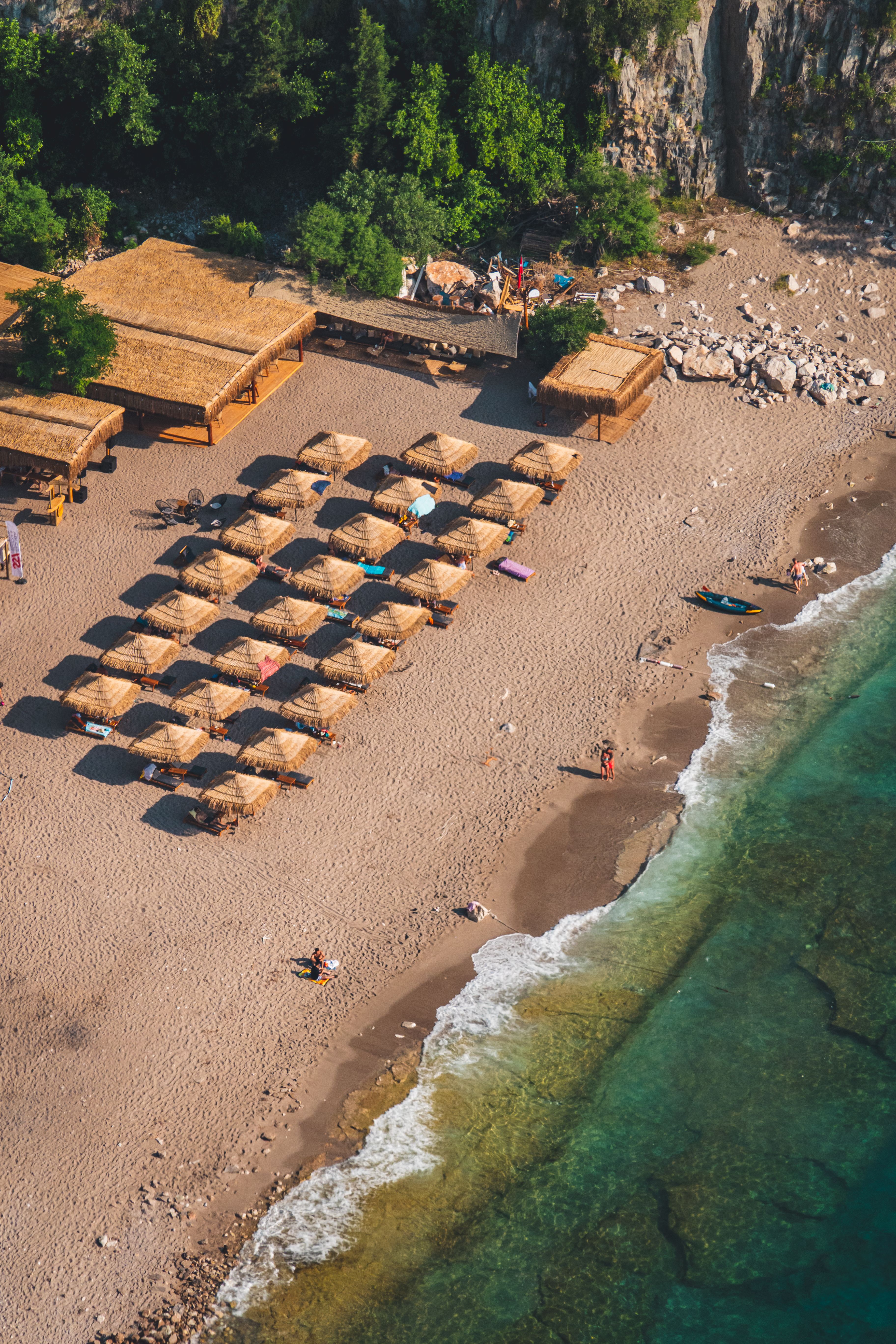 Aerial View of Muğla Beach with Tiki Huts · Free Stock Photo