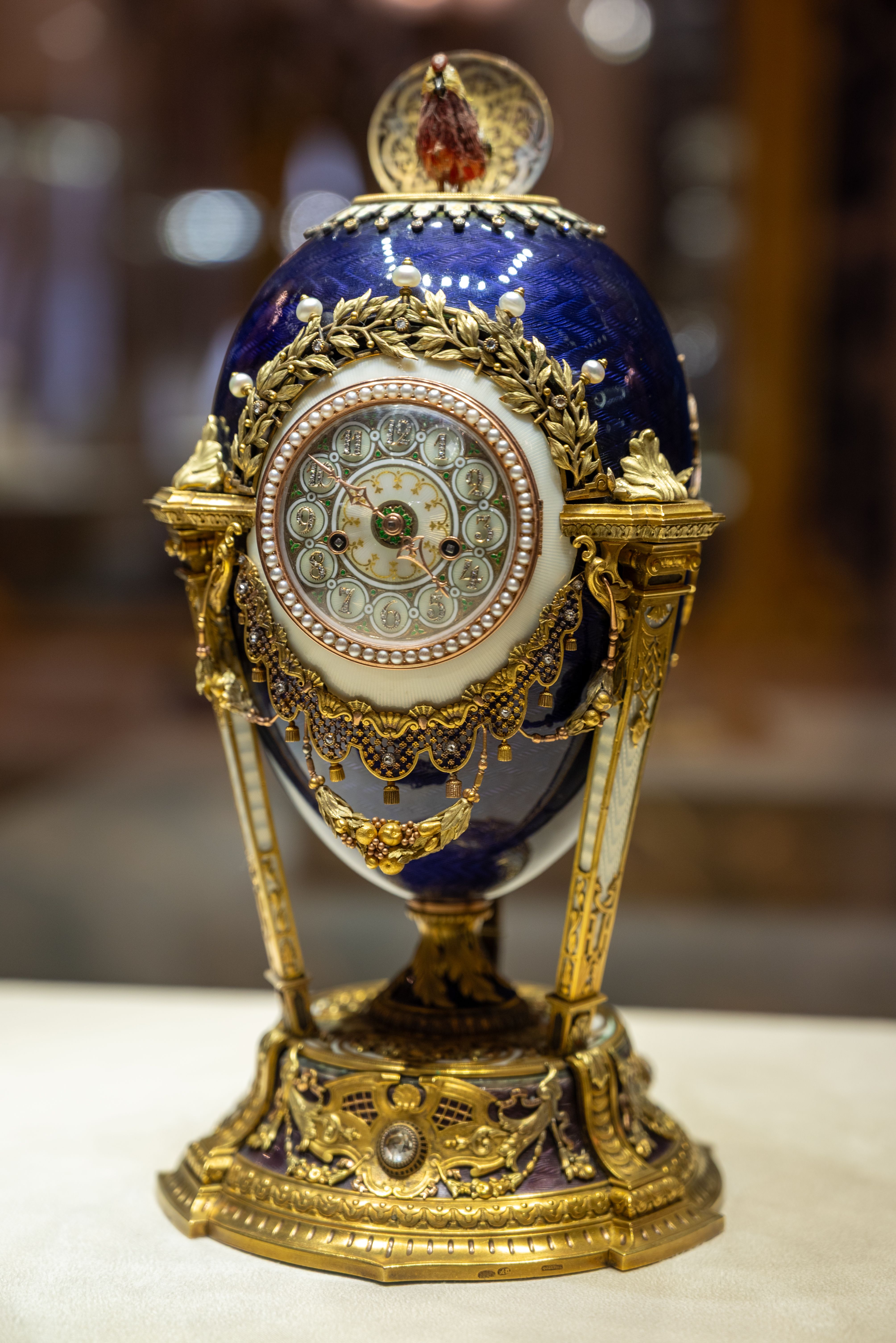 Intricate Fabergé Egg with Clock in Museum Display · Free Stock Photo