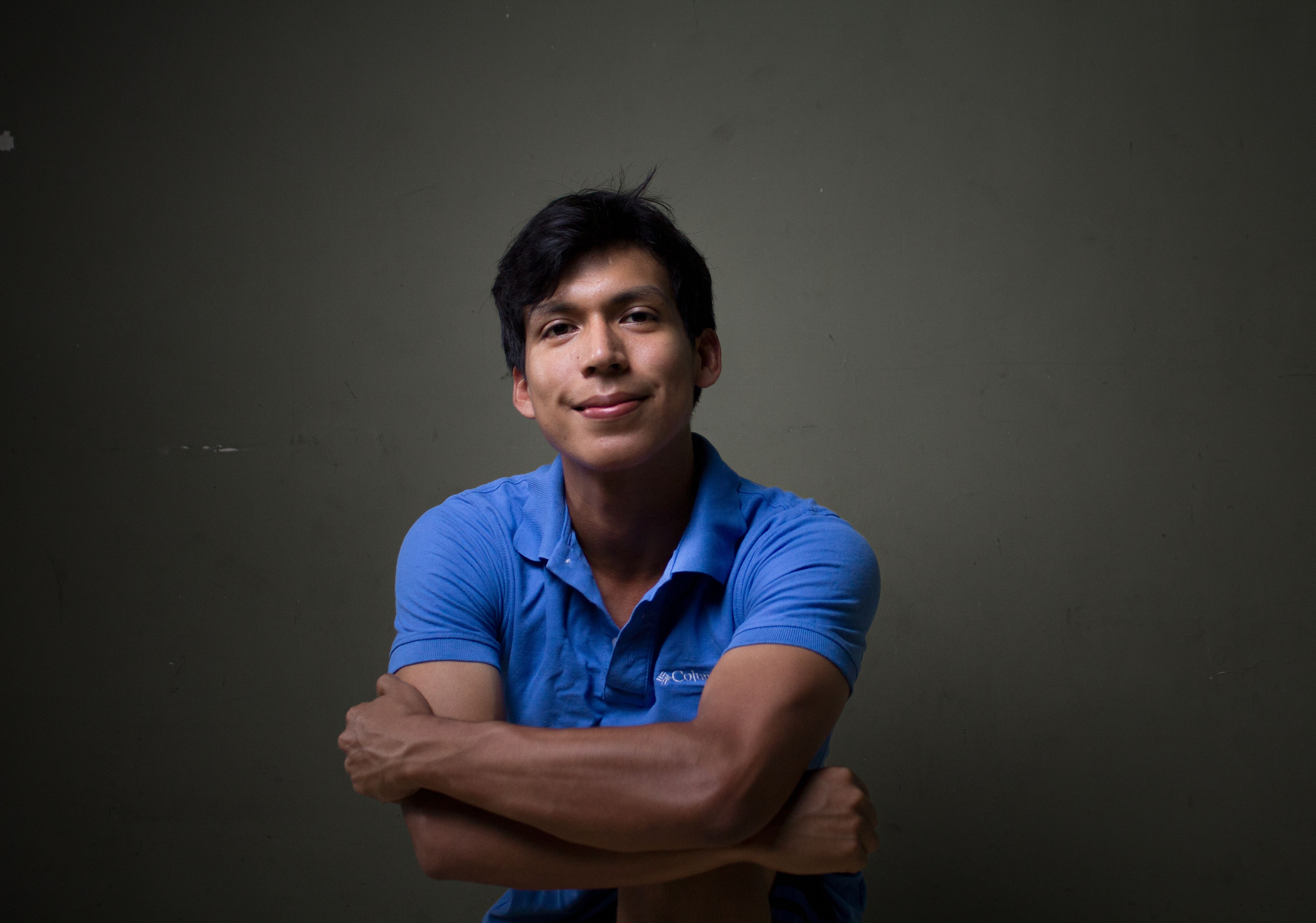 Portrait of a Smiling Young Hispanic Man · Free Stock Photo