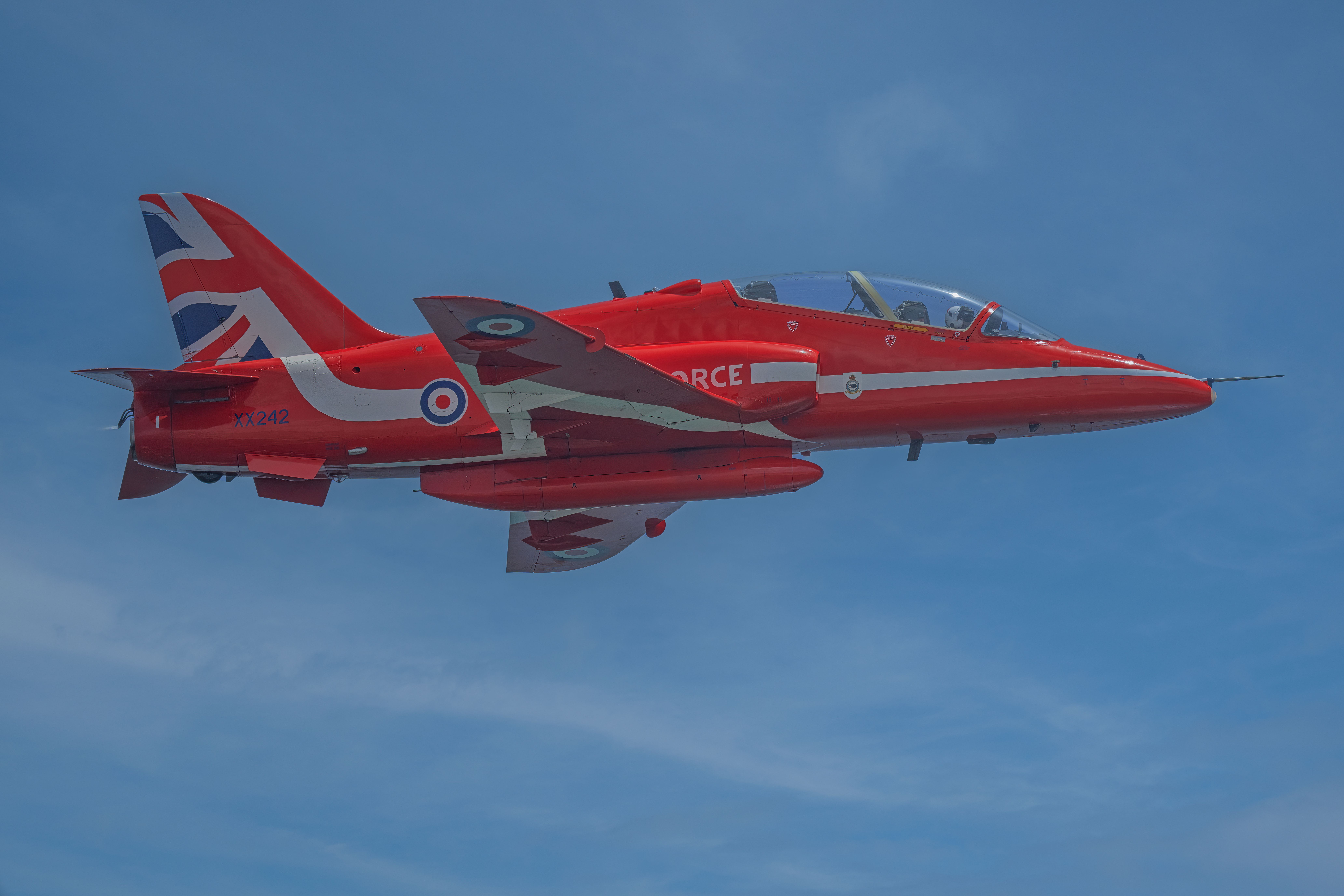 British Aerobatic Jet Flies in Clear Blue Sky · Free Stock Photo