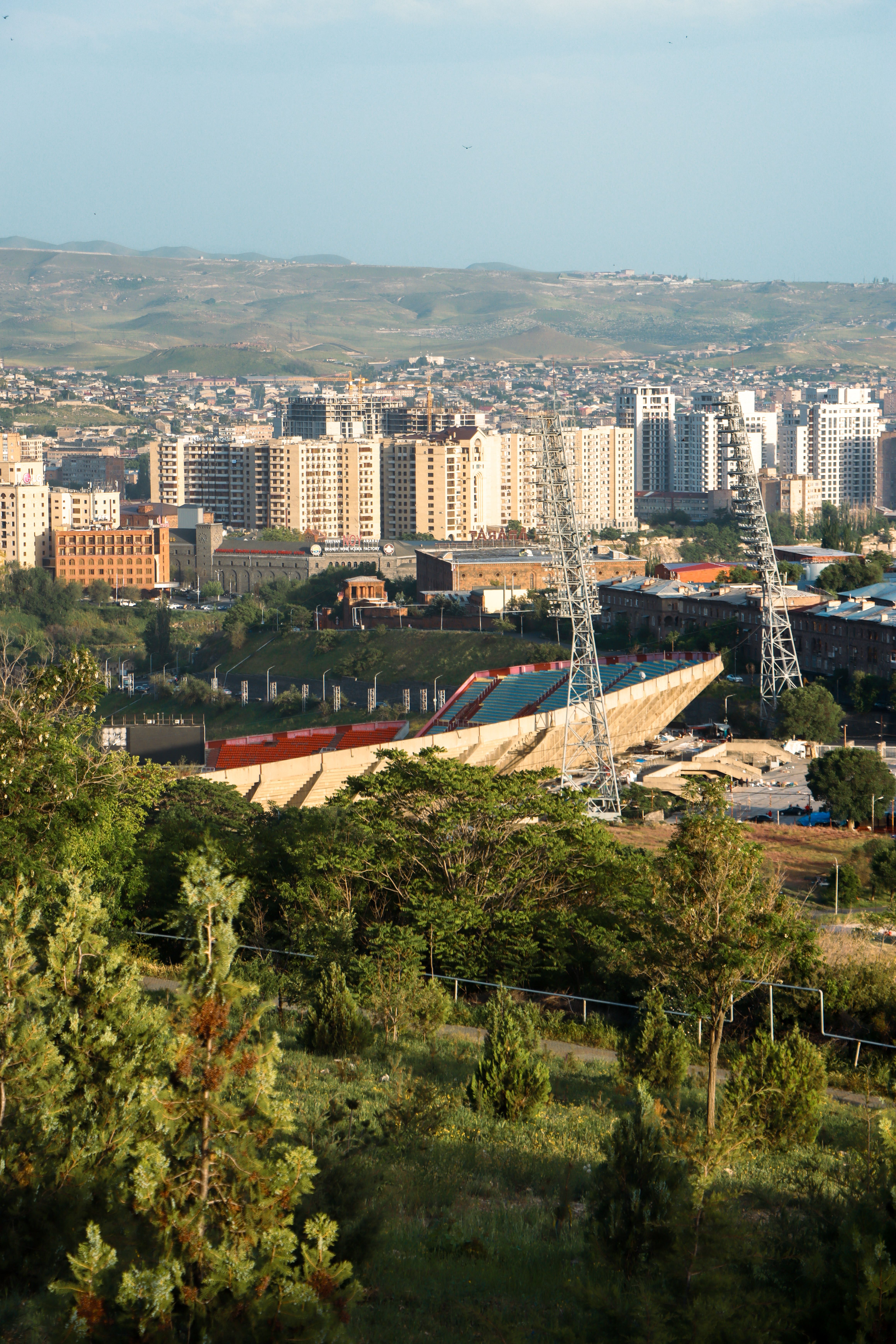 Cityscape View with Stadium and Hills in Distance · Free Stock Photo