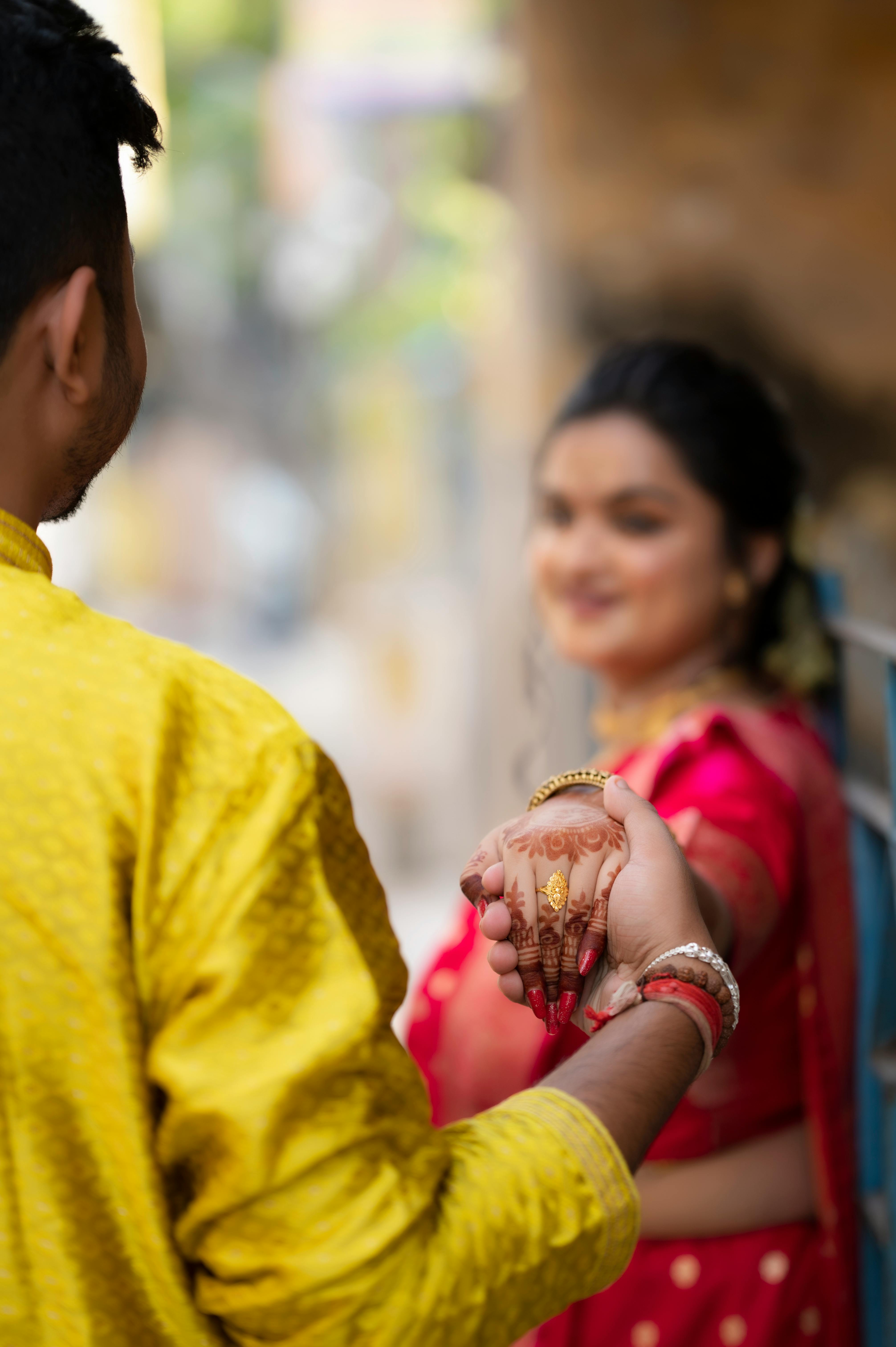 Traditional Indian Couple Holding Hands · Free Stock Photo