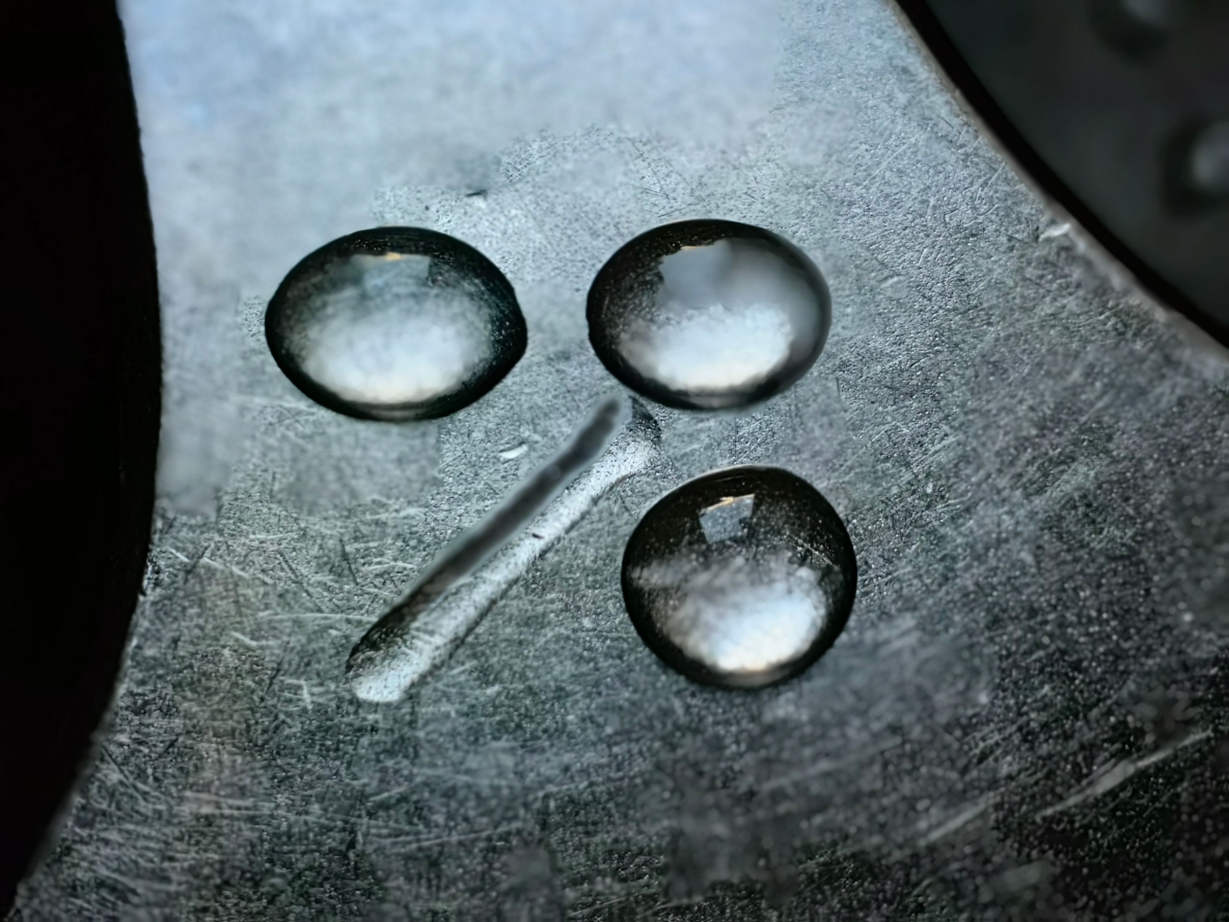 Close-up of Water Droplets on Metal Surface · Free Stock Photo