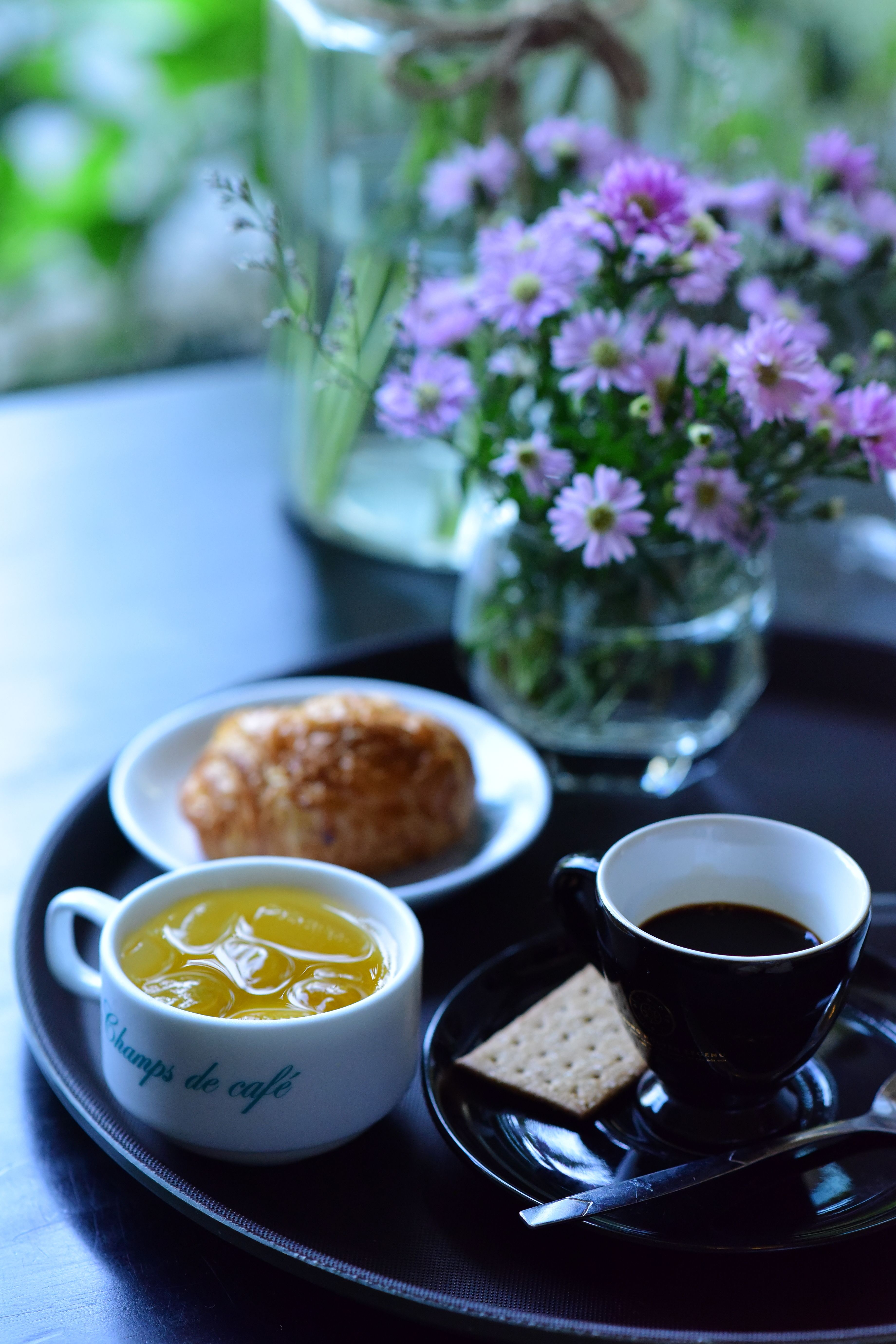 Elegant Coffee Breakfast with Flowers in Natural Light · Free Stock Photo