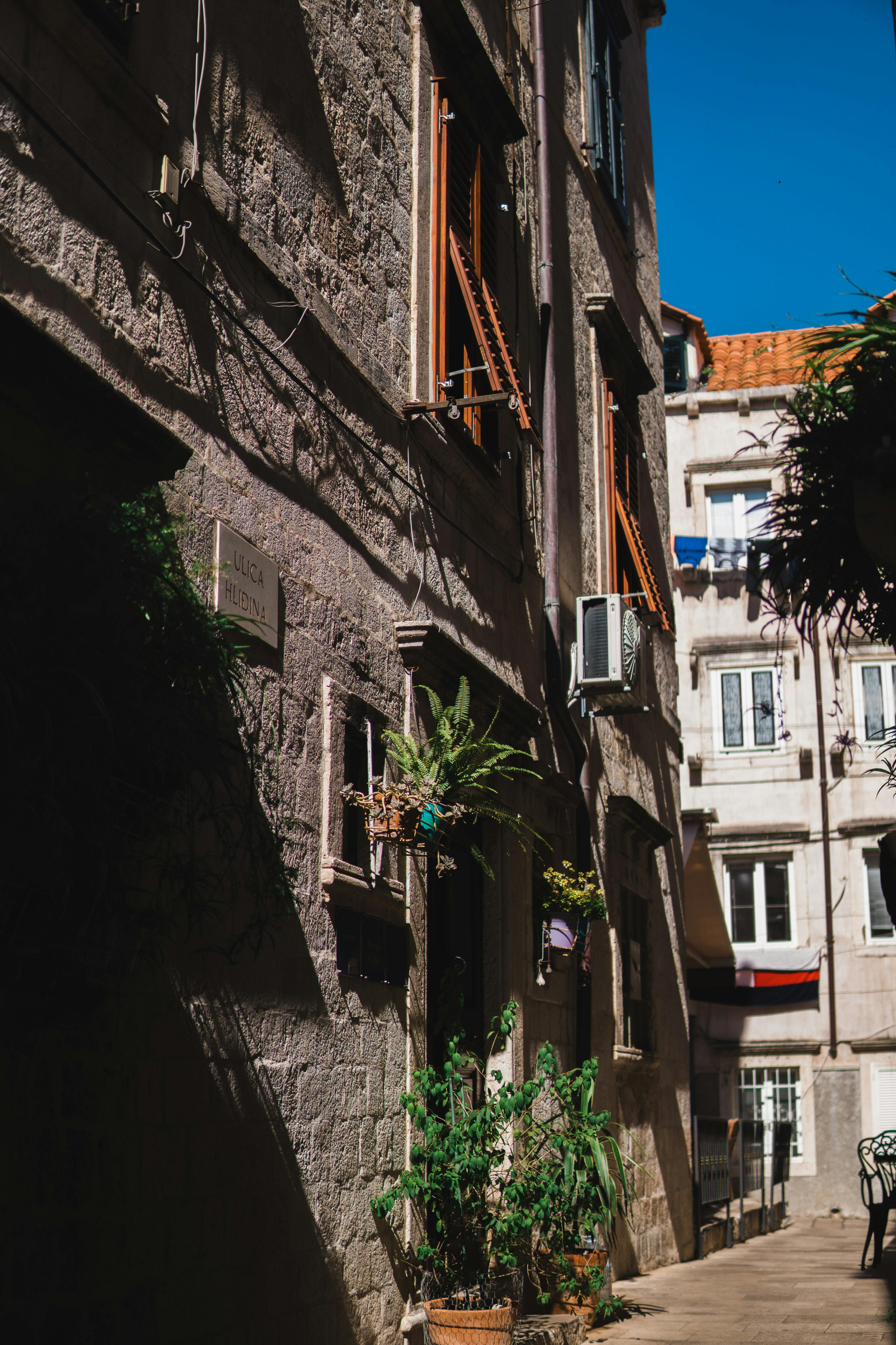 Brown Concrete Mid-rise Buildings · Free Stock Photo