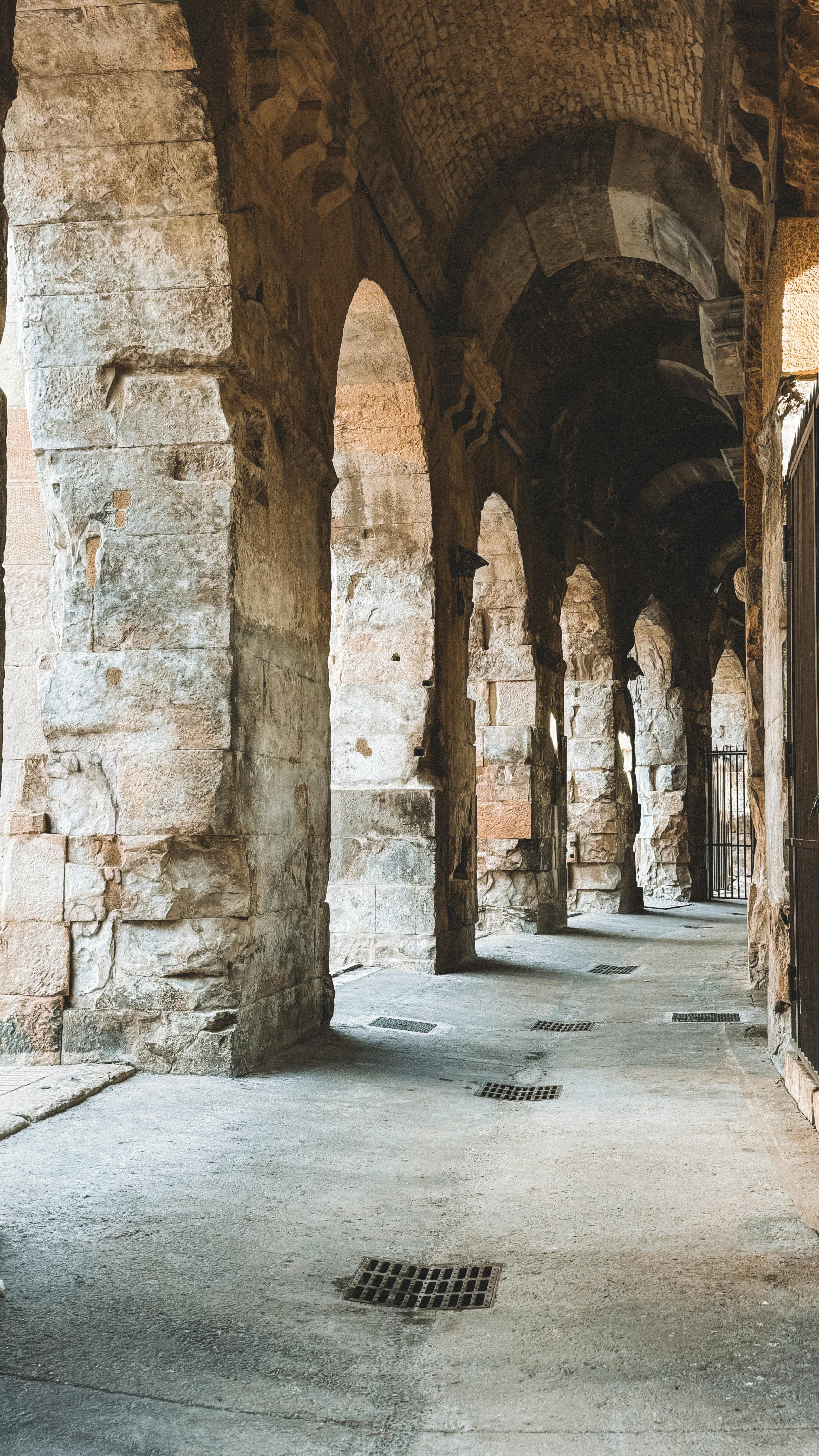 Ancient Roman Colosseum Interior Arches View · Free Stock Photo