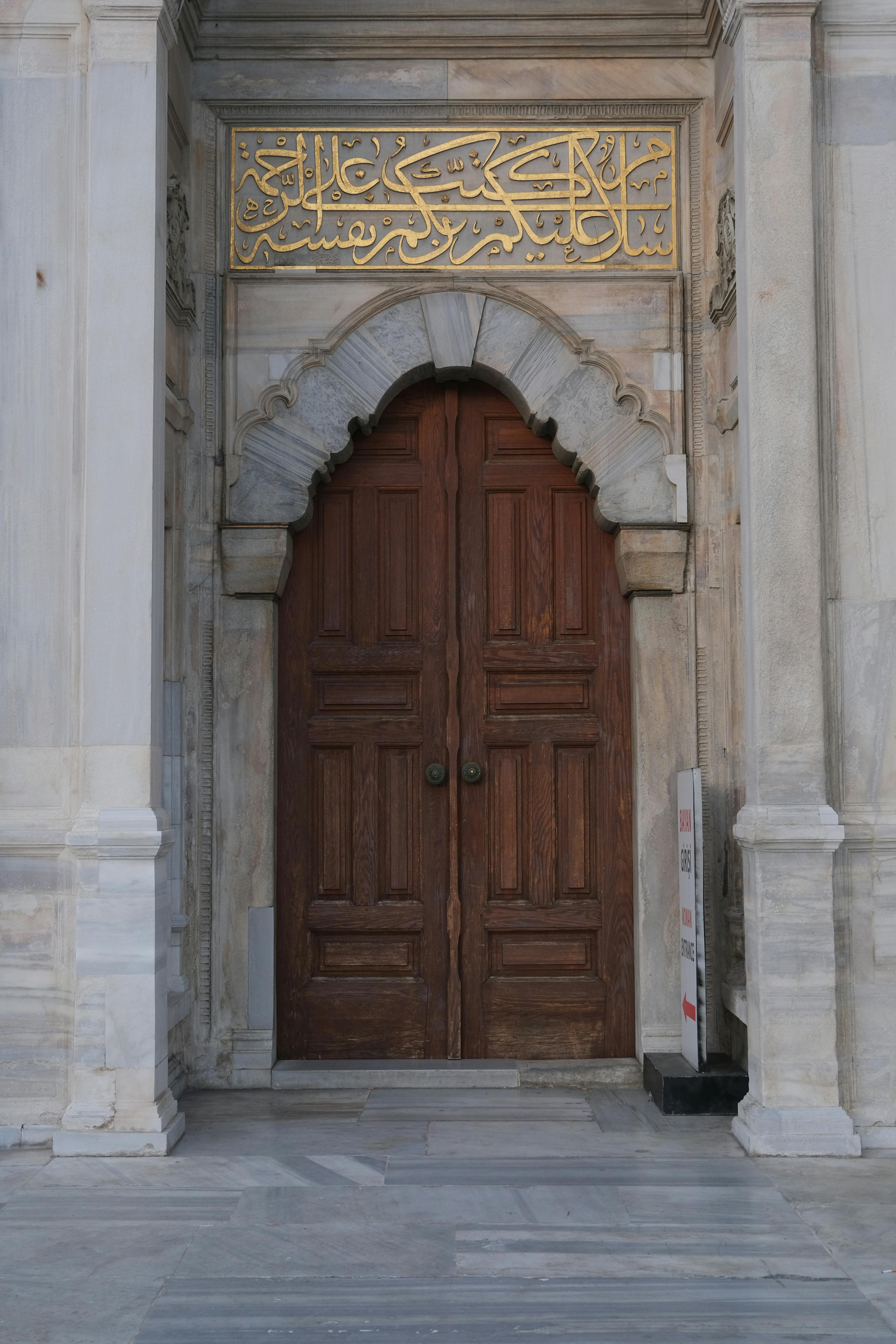 Elegant Wooden Doorway in Historic Marble Building · Free Stock Photo