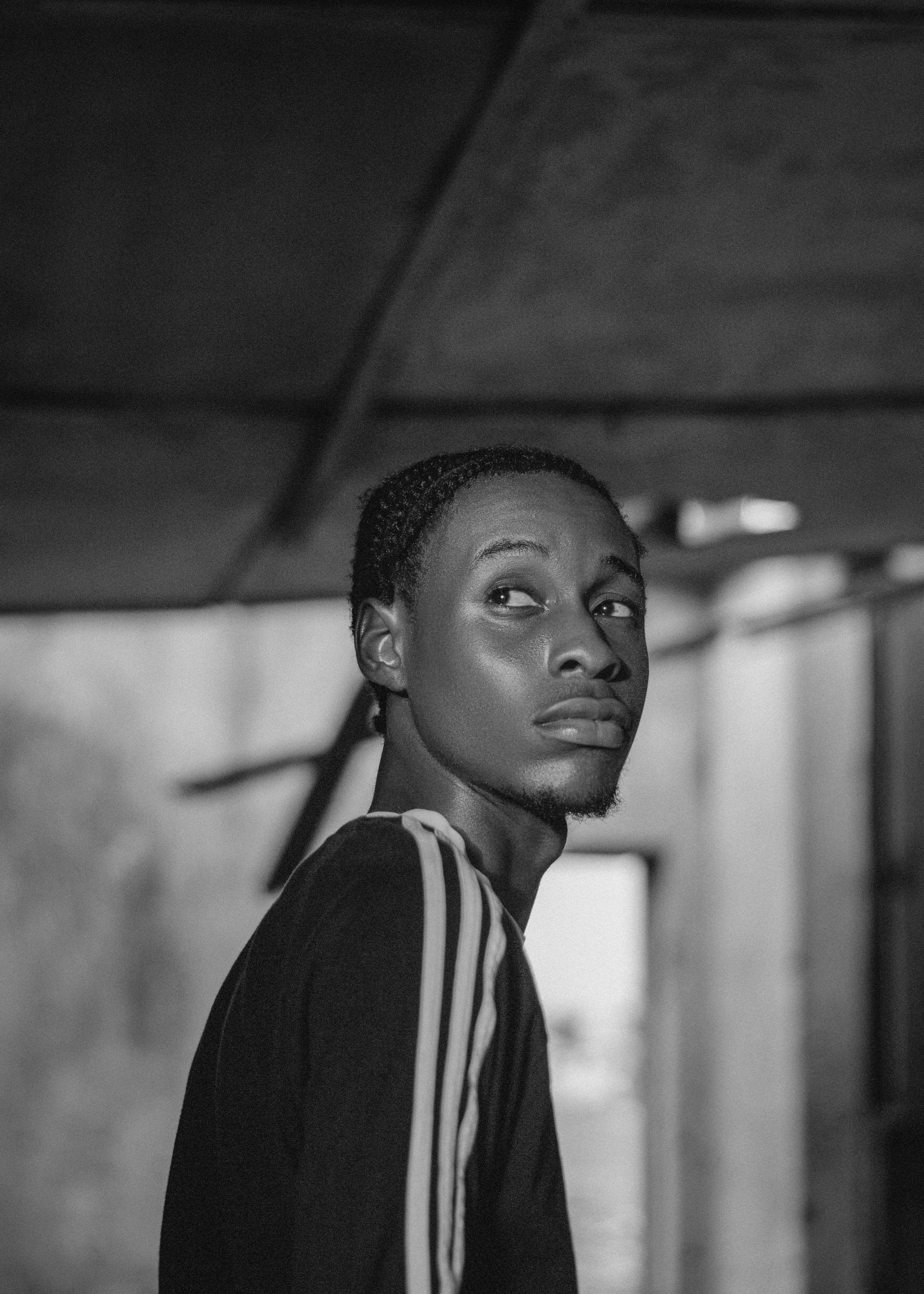 Black and White Portrait of Thoughtful Individual · Free Stock Photo