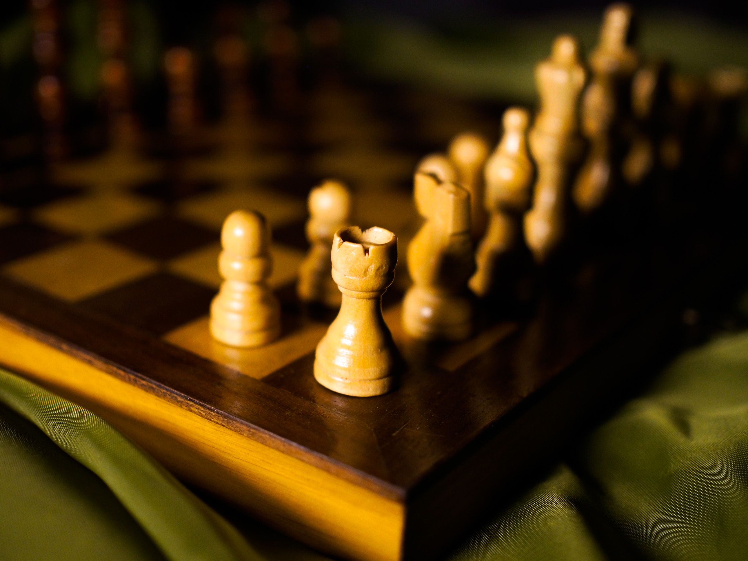 Close-up of Wooden Chess Pieces on Board · Free Stock Photo