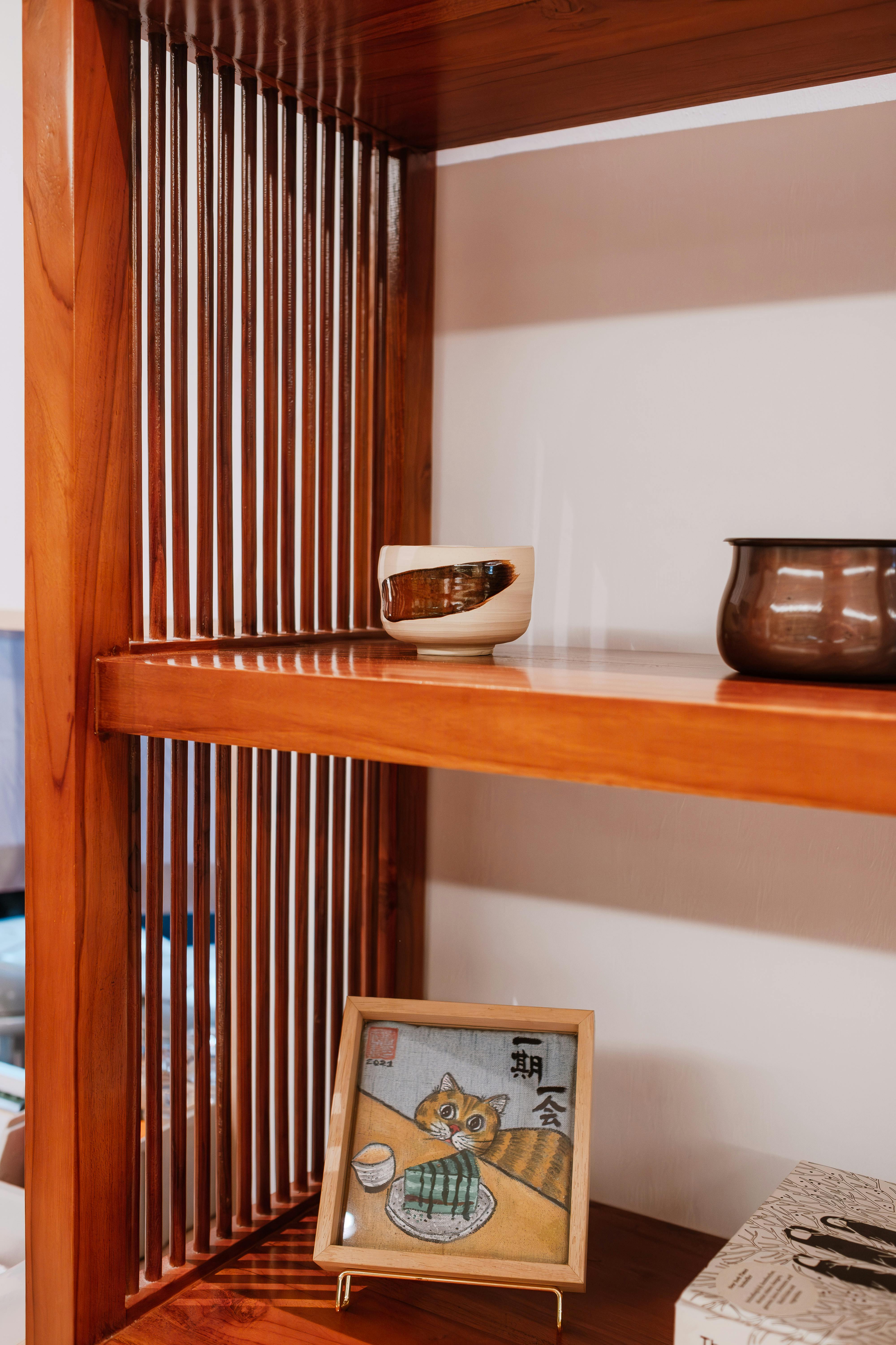 Modern Wooden Shelf with Artistic Decor Items · Free Stock Photo