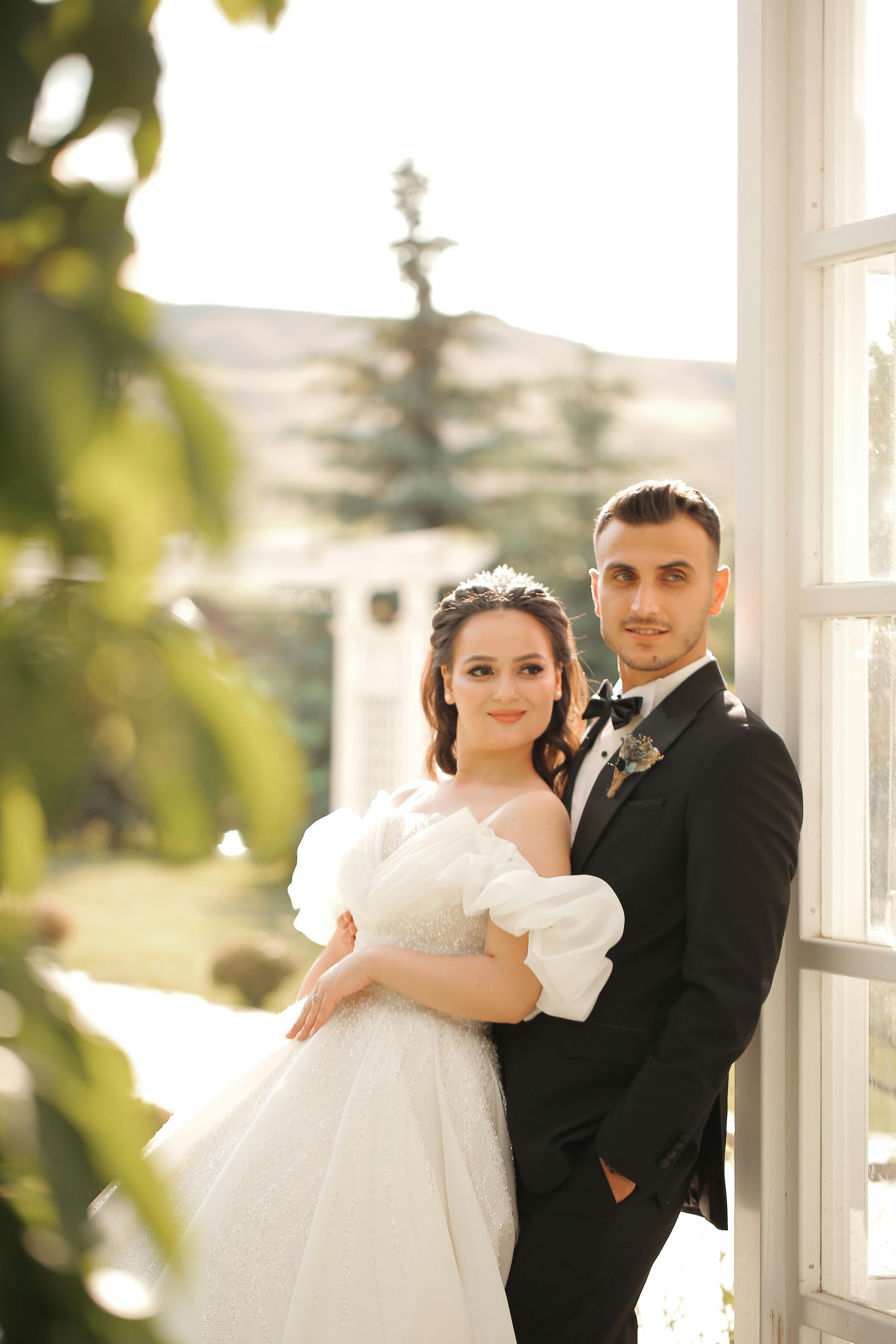 Elegant Outdoor Wedding Portrait of Bride and Groom · Free Stock Photo