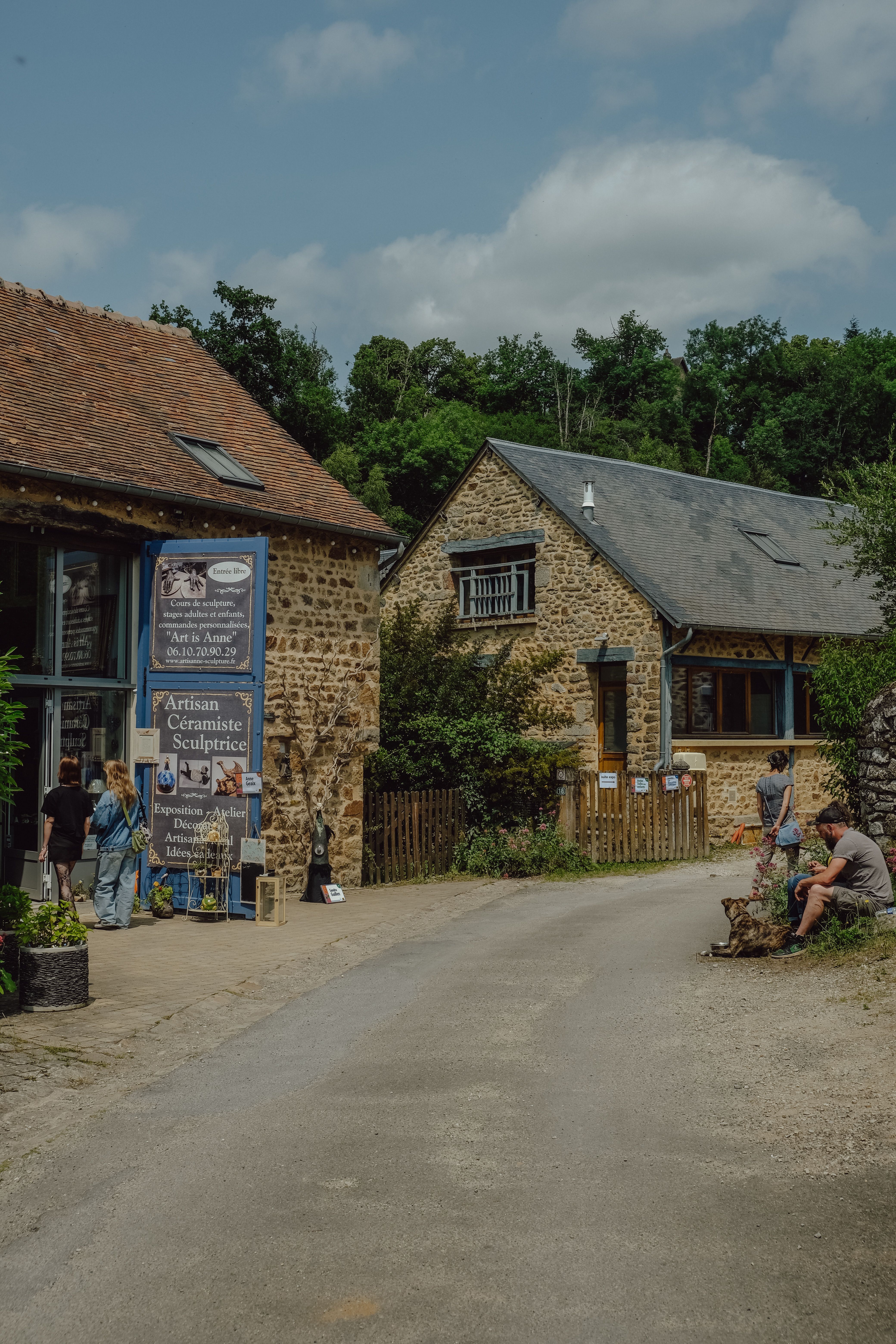 Rustic Village Street with Artisan Shops · Free Stock Photo