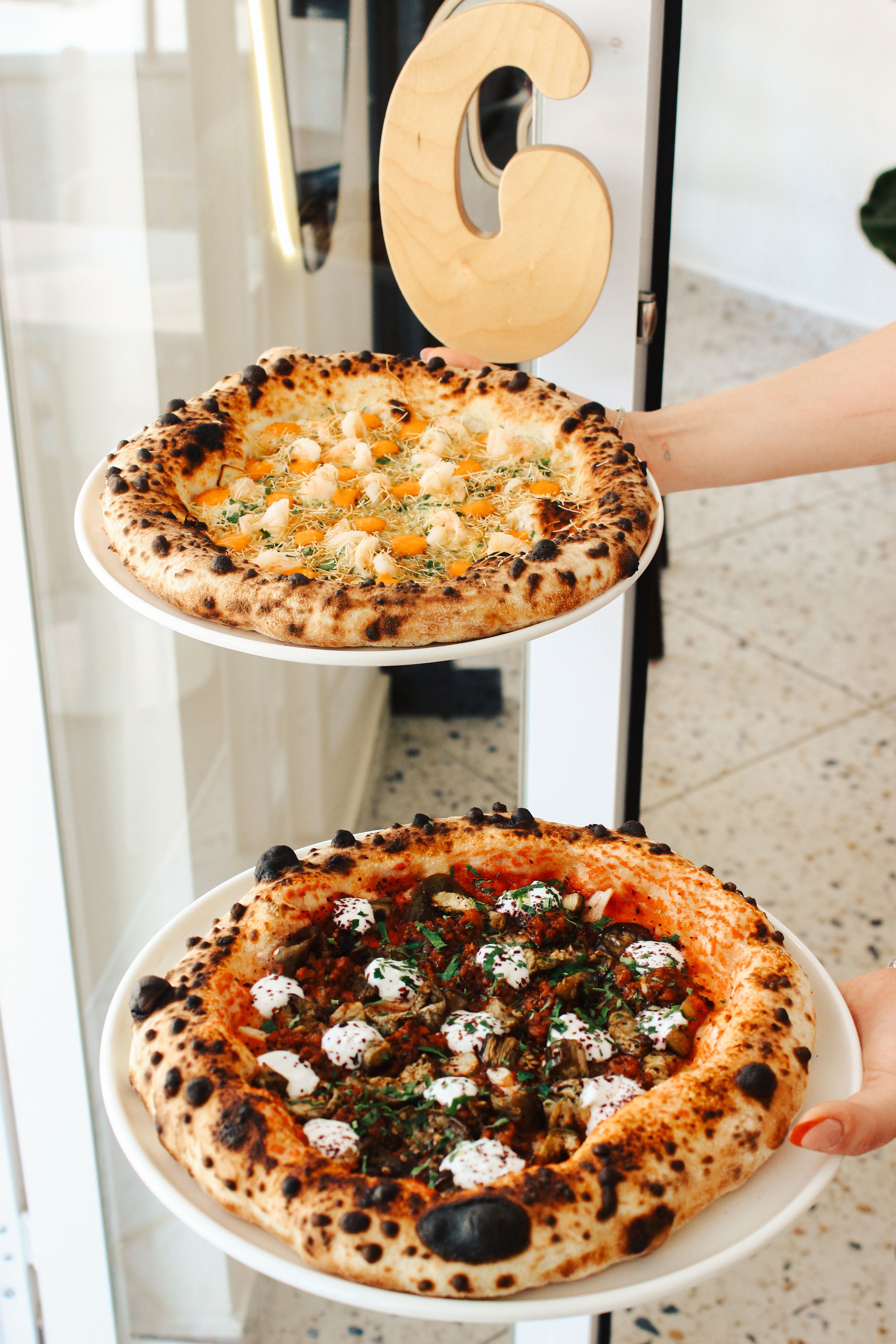 Delicious Neapolitan Style Pizza on Plates · Free Stock Photo