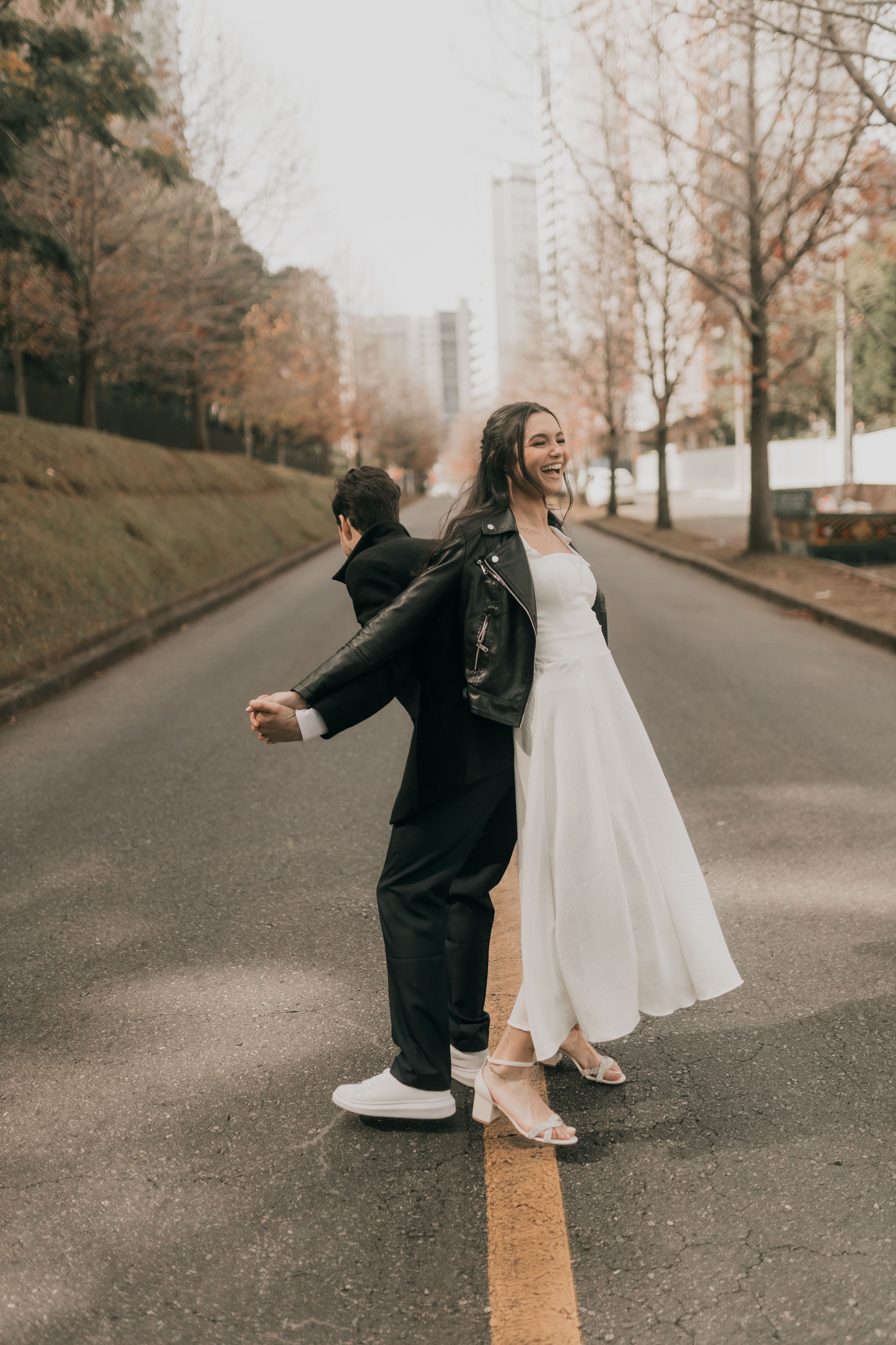 Joyful Couple Dancing on Autumn Street · Free Stock Photo