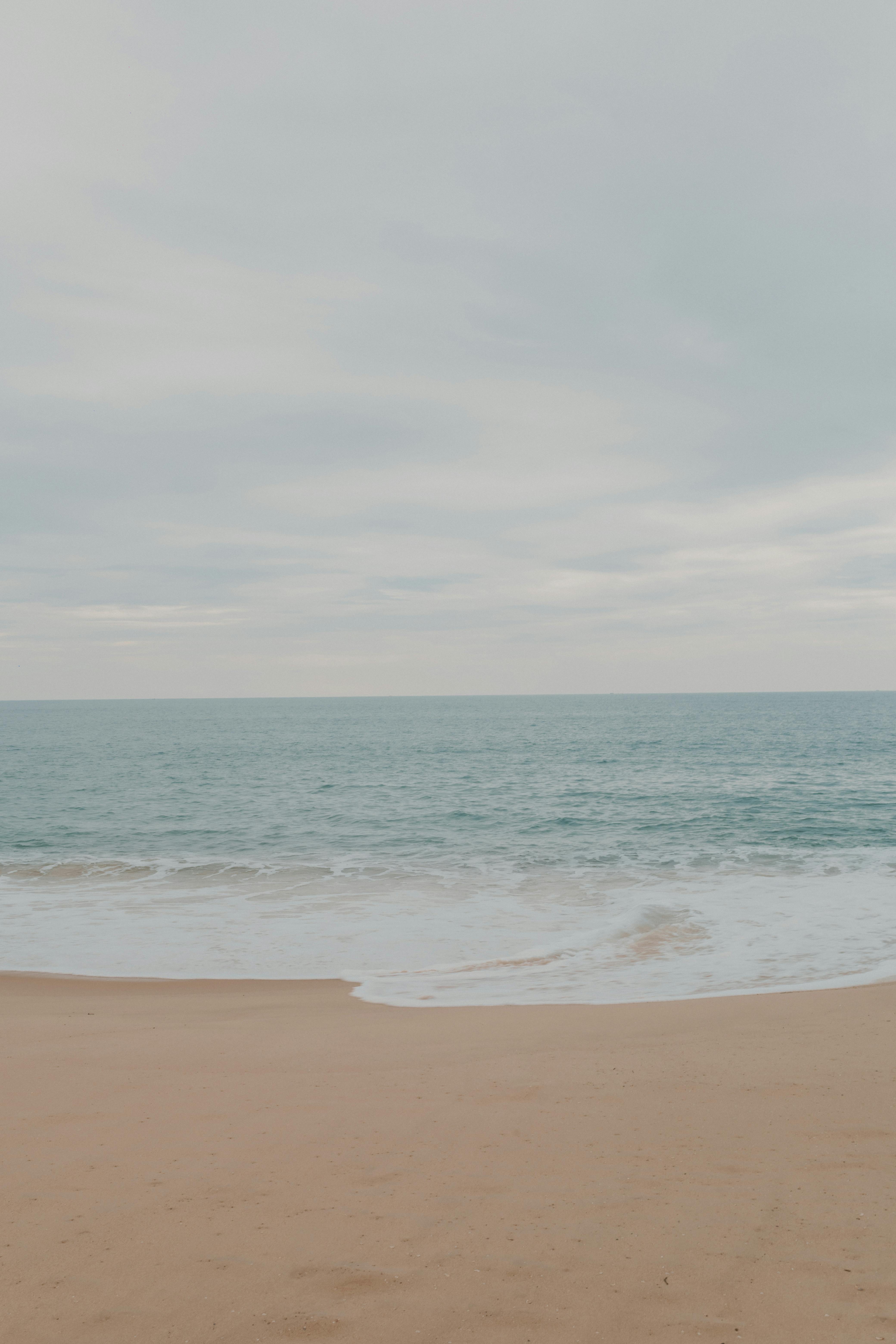 Calm Seaside Landscape with Sandy Beach · Free Stock Photo